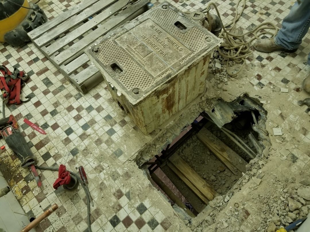 Removing an old grease trap from a 100+ year old building. | Scrolller