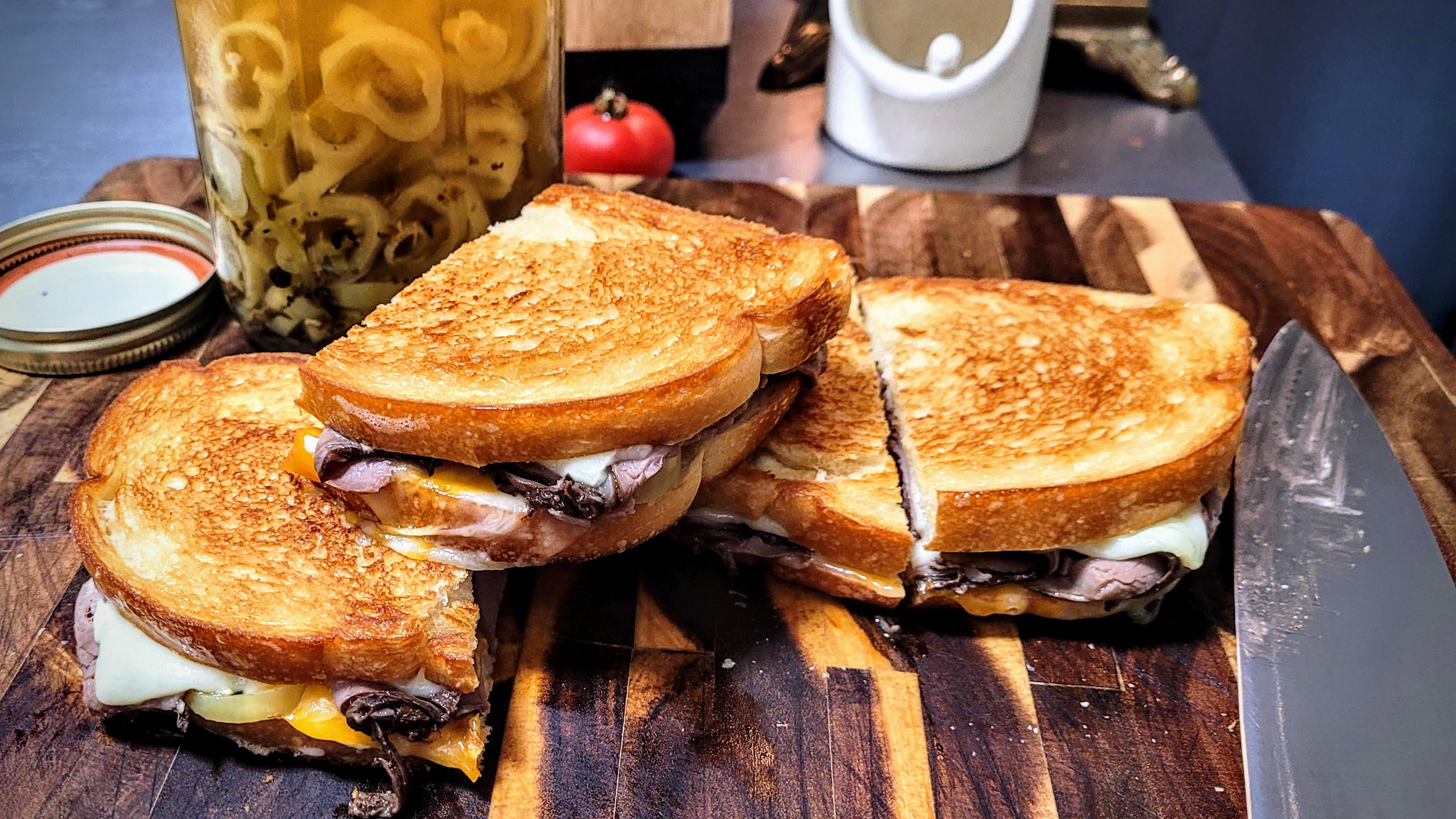 Roast beef, homemade pickled peppers, colby jack and havarti on sourdough | Scrolller