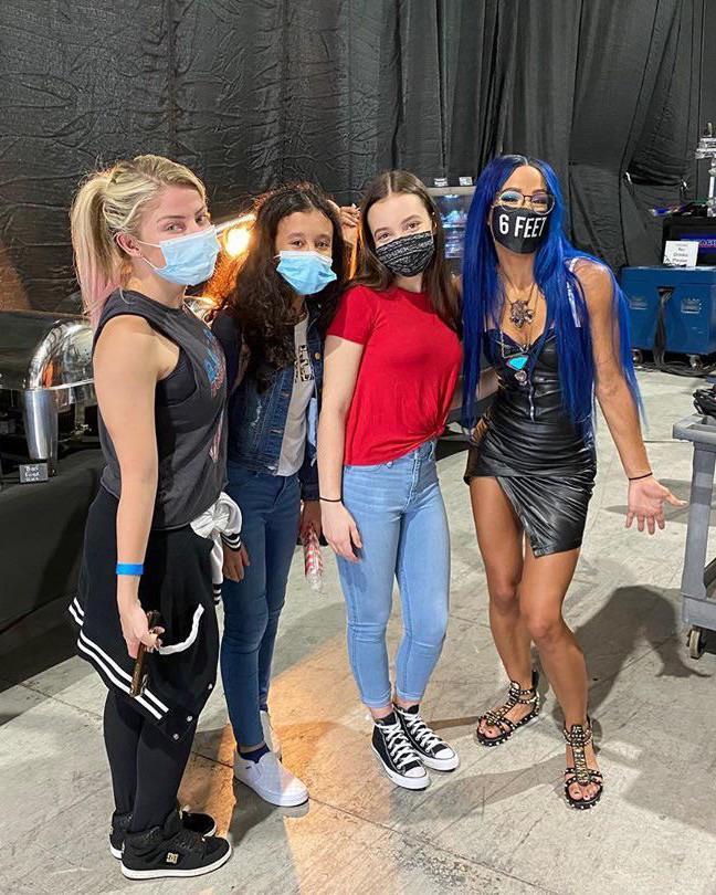 Sasha Banks and Alexa Bliss shooting a PSA commercial today with these two girls | Scrolller