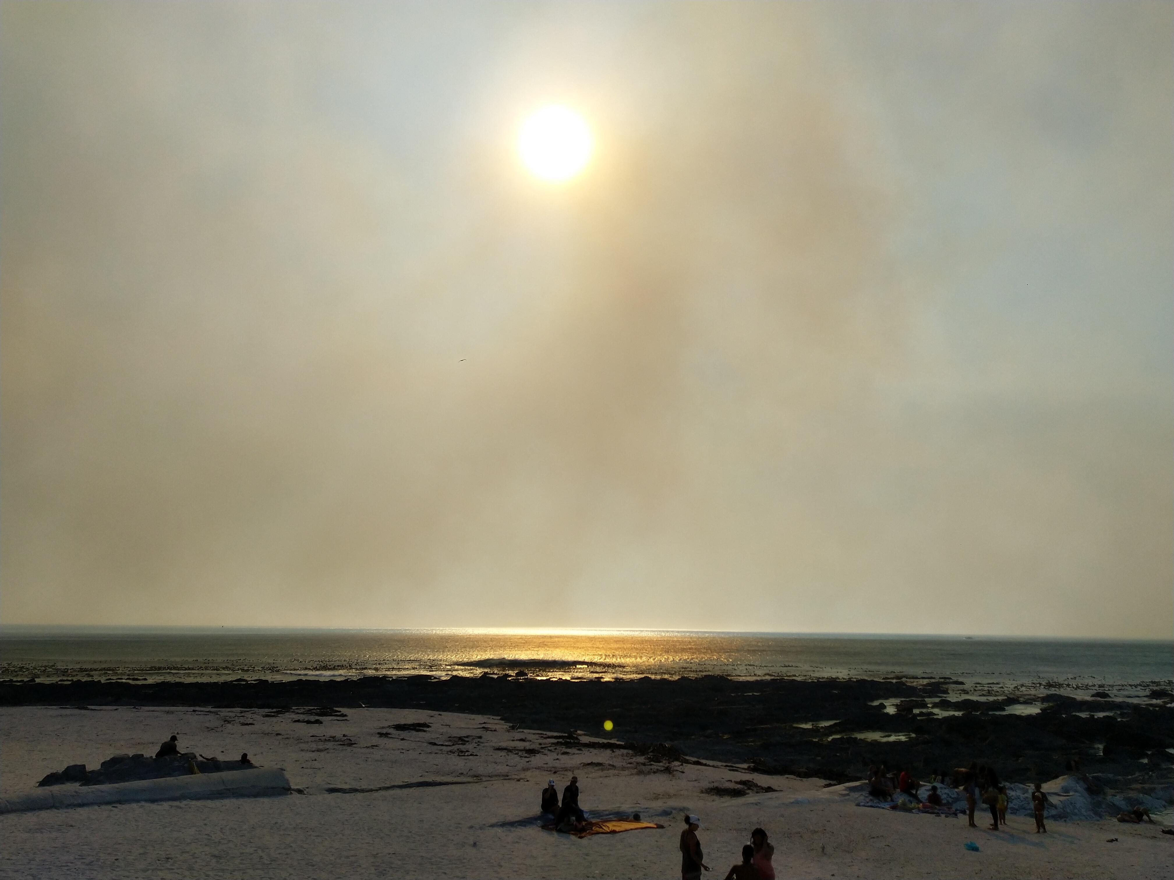 Sea Point today, smokiest, dustied cloud ever... Affected the Sun's rays over the ocean | Scrolller