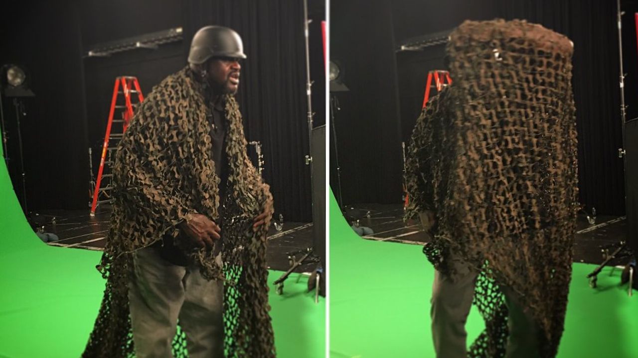 Shaq holding a ghillie suit in front of a green screen | Scrolller