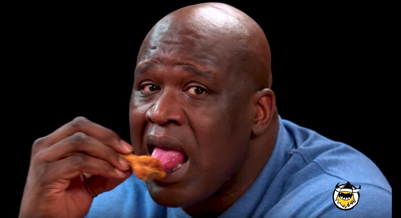 Shaq holding big wing | Scrolller