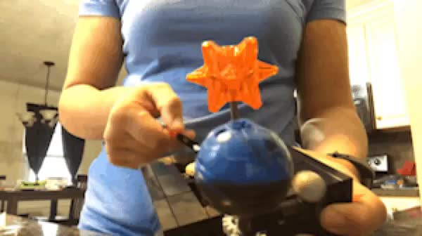 She made a spinning lego thingie. | Scrolller