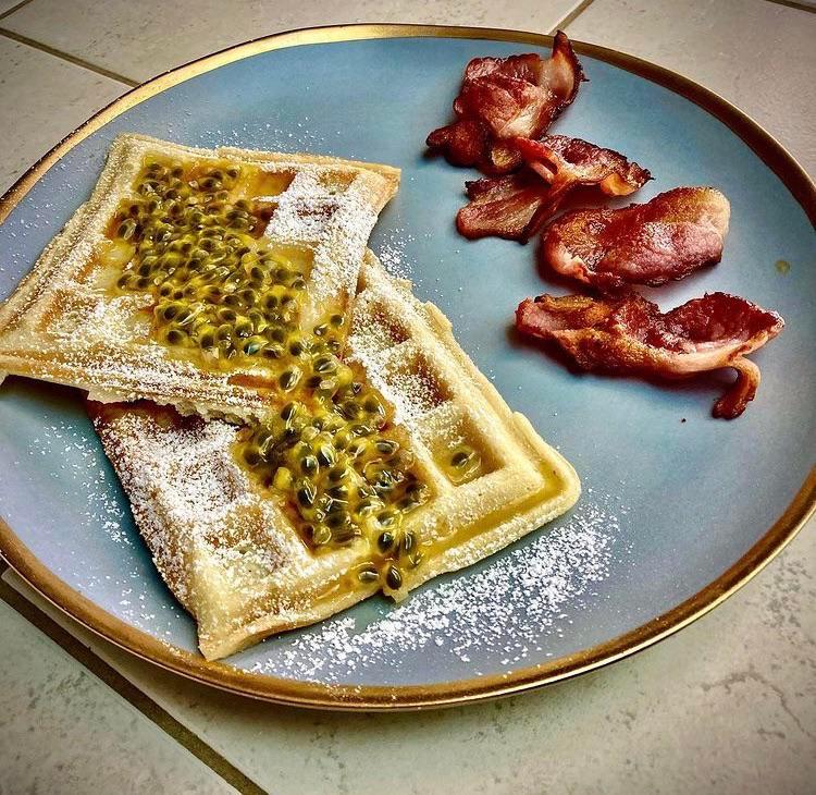 Simple waffles and bacon, with passion fruit maple syrup. | Scrolller