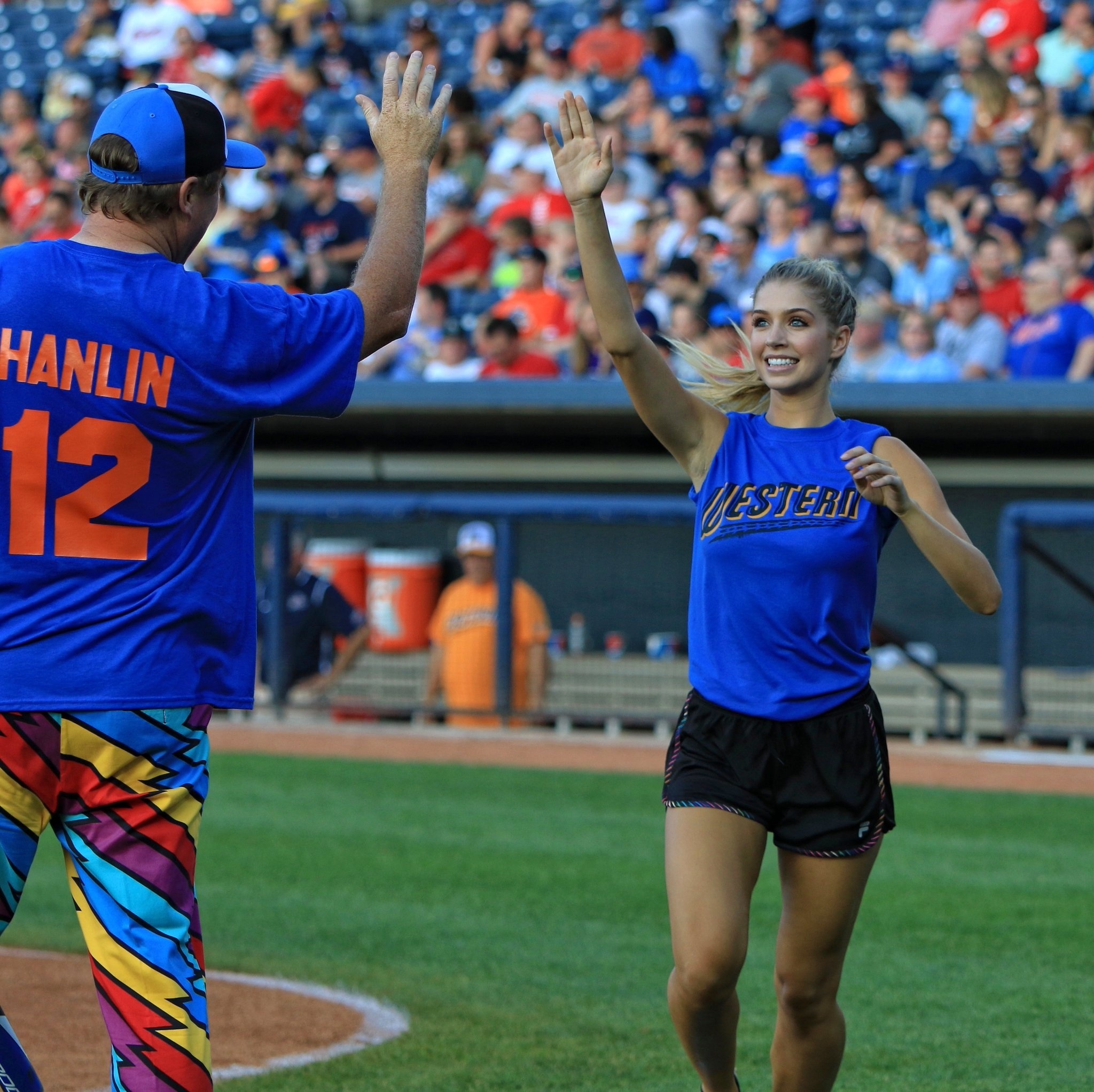 Softball game high five | Scrolller