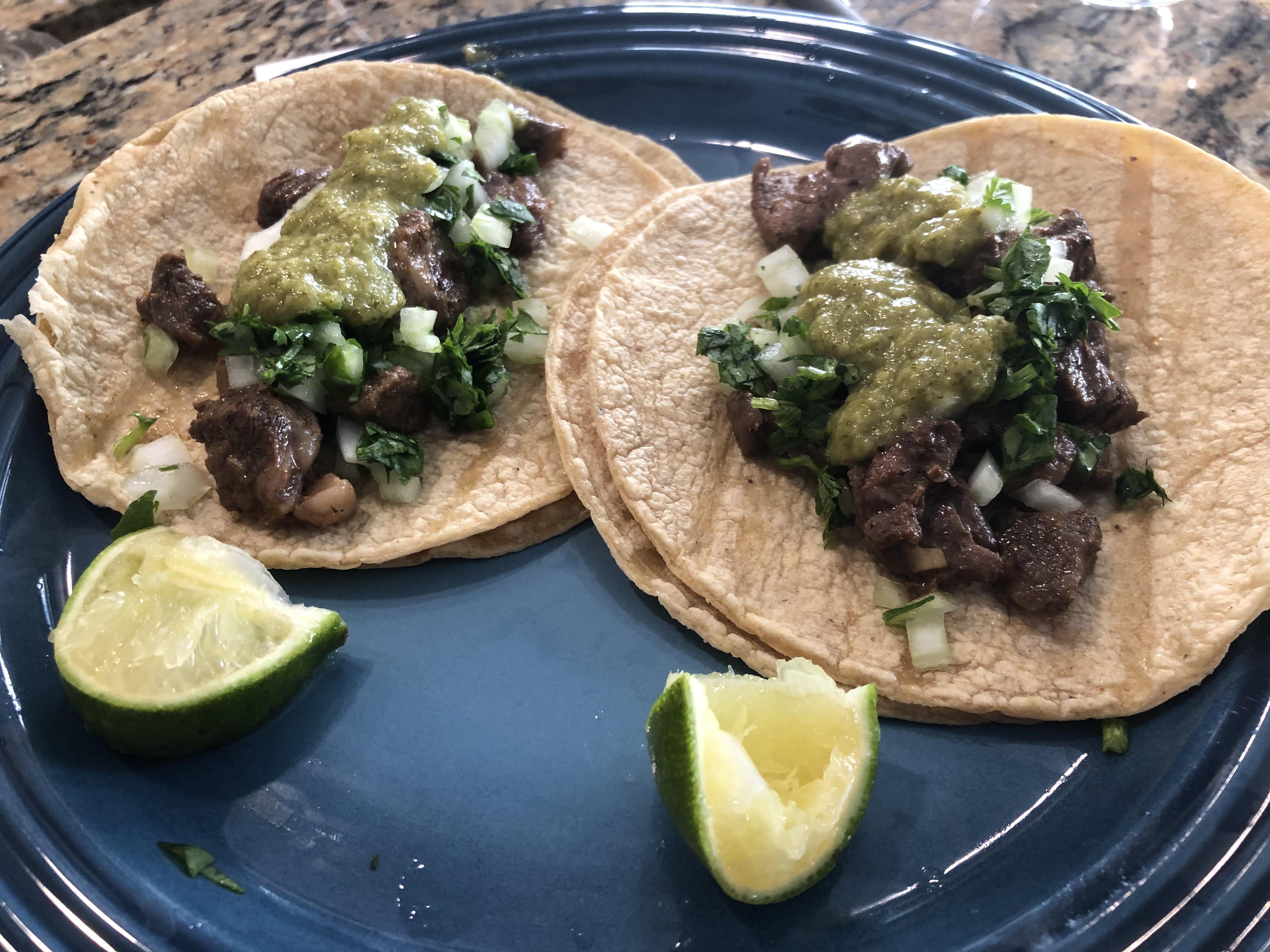 Sous vide steak tacos with homemade salsa verde. | Scrolller