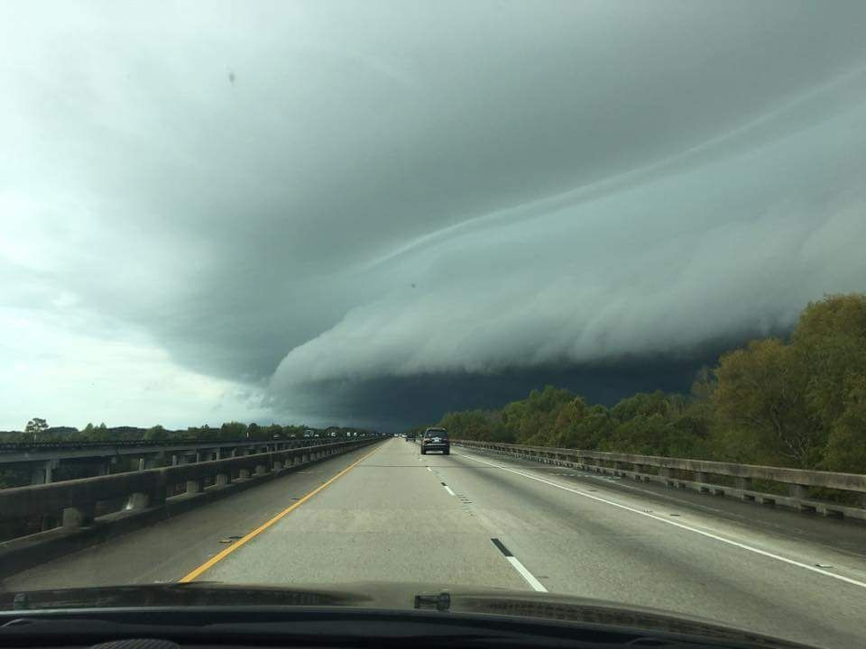 Storms rolling in over Basin Bridge, South Louisiana. | Scrolller