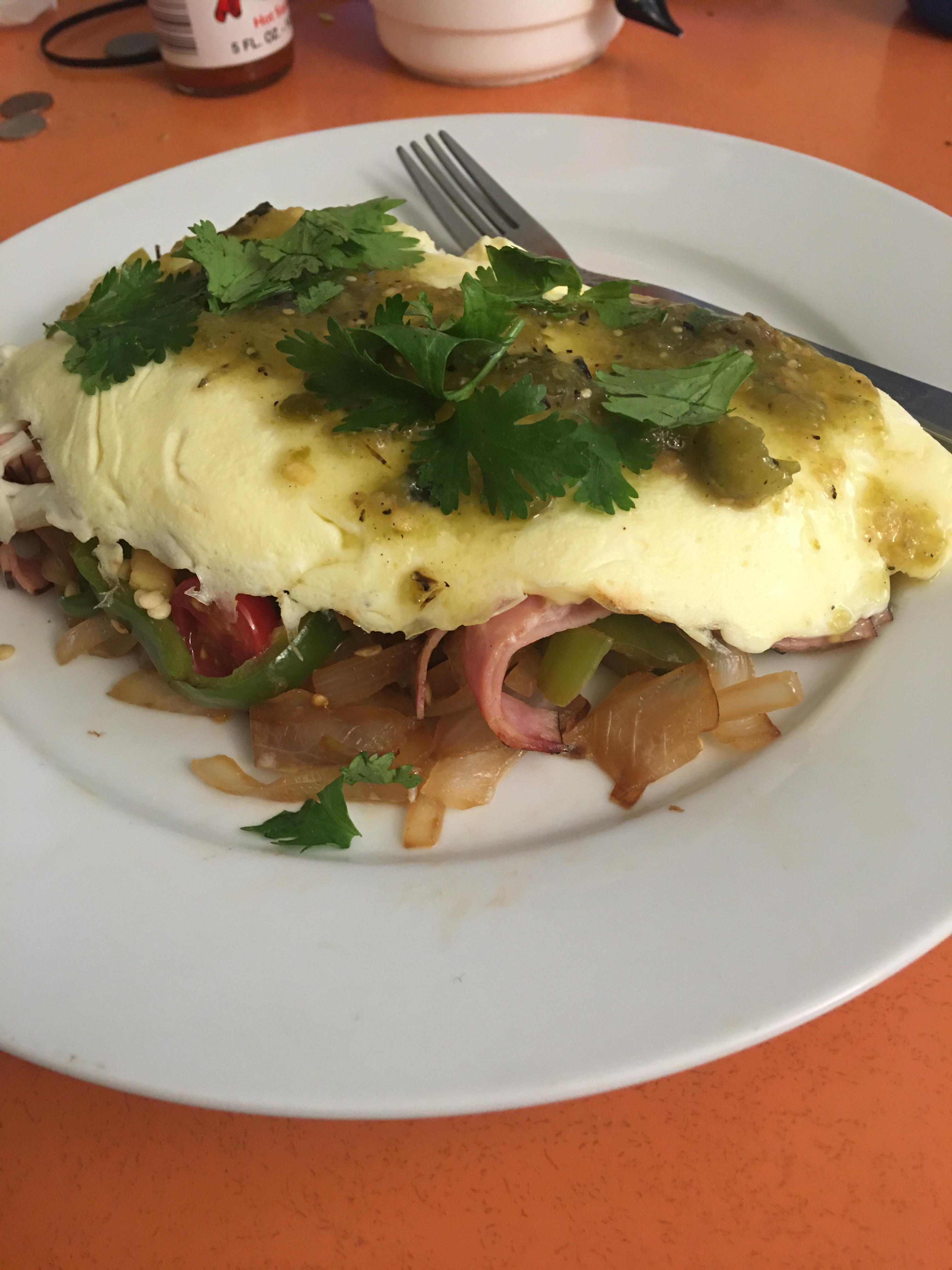 STUFFED OMELETTE - Ham, Cherry Tomato, Grilled Onion, Hatch Chili, Tomatillo Salsa, and Cilantro ...