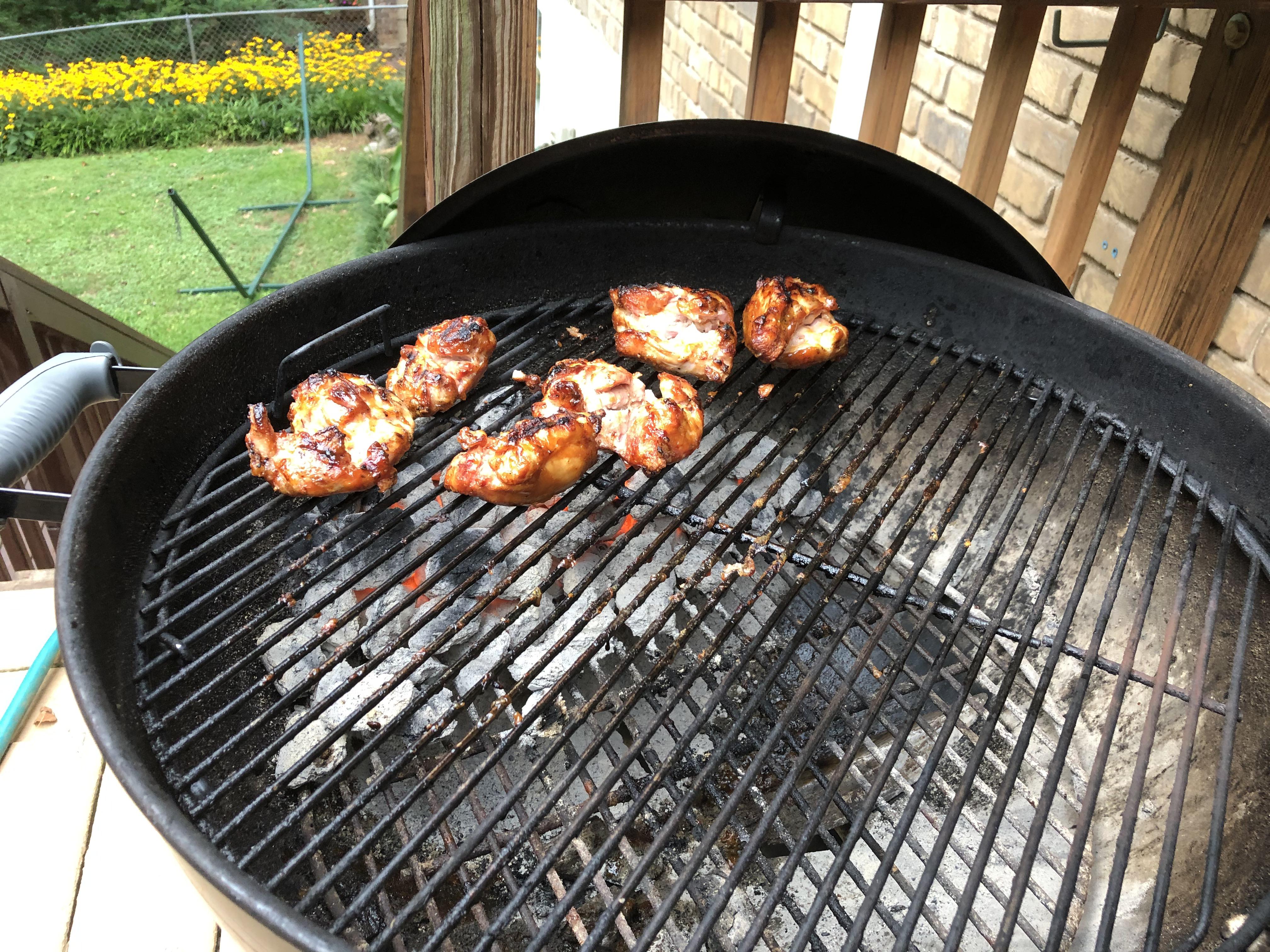Sunday’s are for grilling. Chicken thighs on charcoal. 😺 | Scrolller