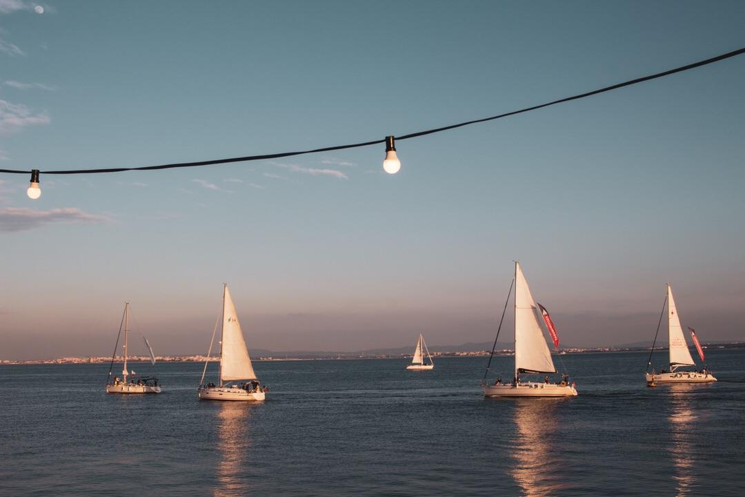 Sunset traffic on the Tejo. | Scrolller