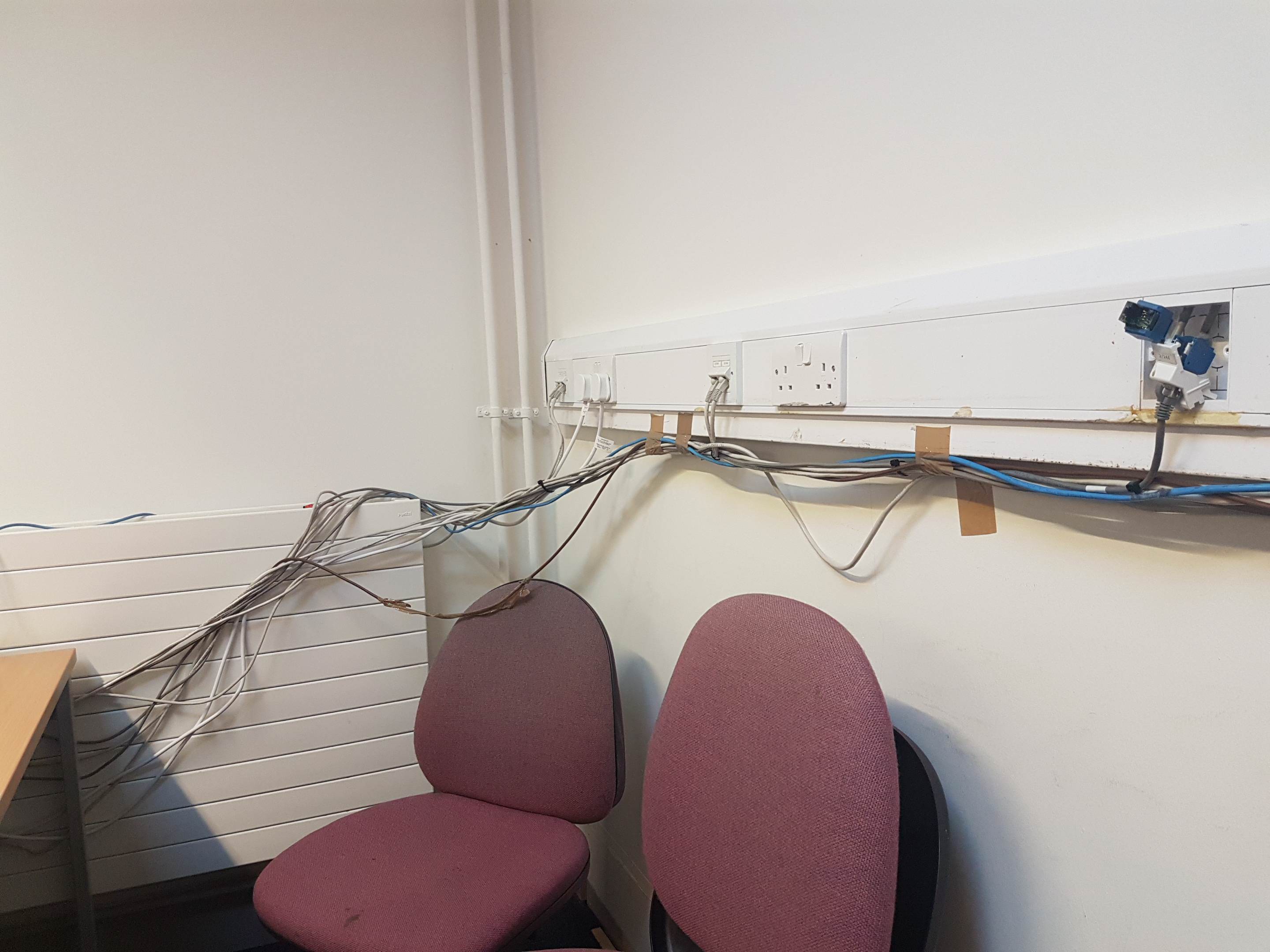 The cable setup in a classroom in my college. | Scrolller