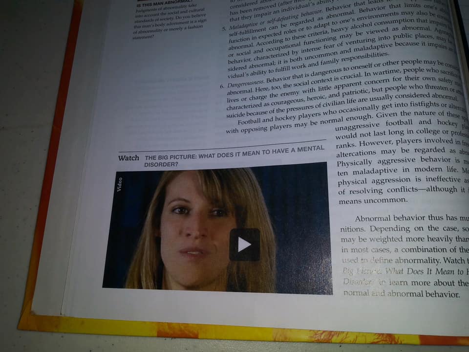 There's a play button on this textbook picture | Scrolller