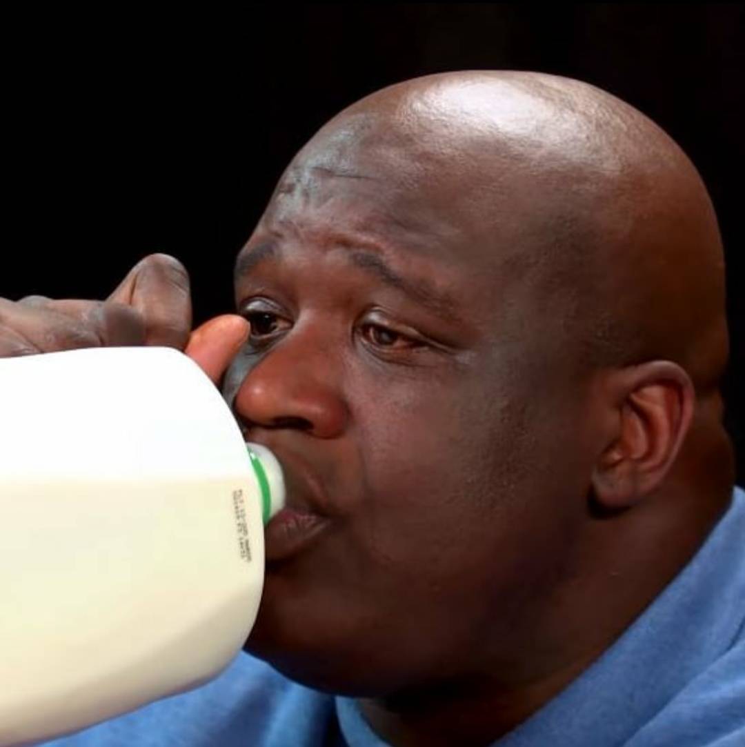 Thirsty Shaq holding milk | Scrolller