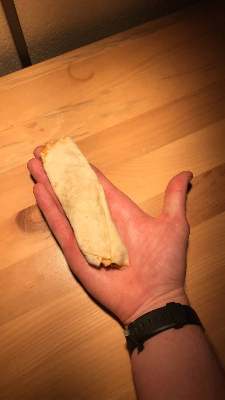 This Is Off The Taco Bell Dollar Menu And Saying Its Two Full Bites Is Being Very Generous