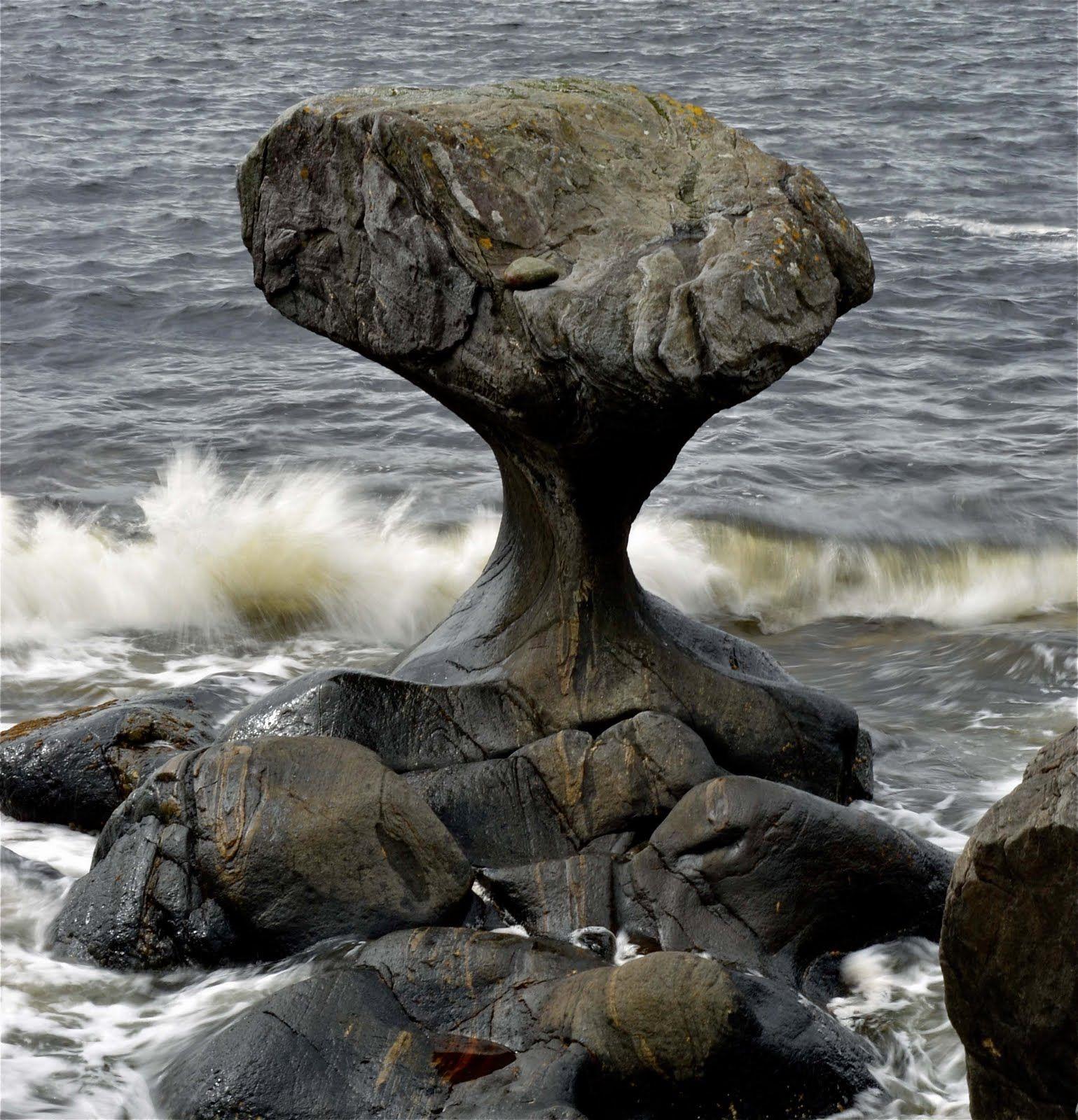 This rock formation caused by lifetimes of waves crashing against it | Scrolller