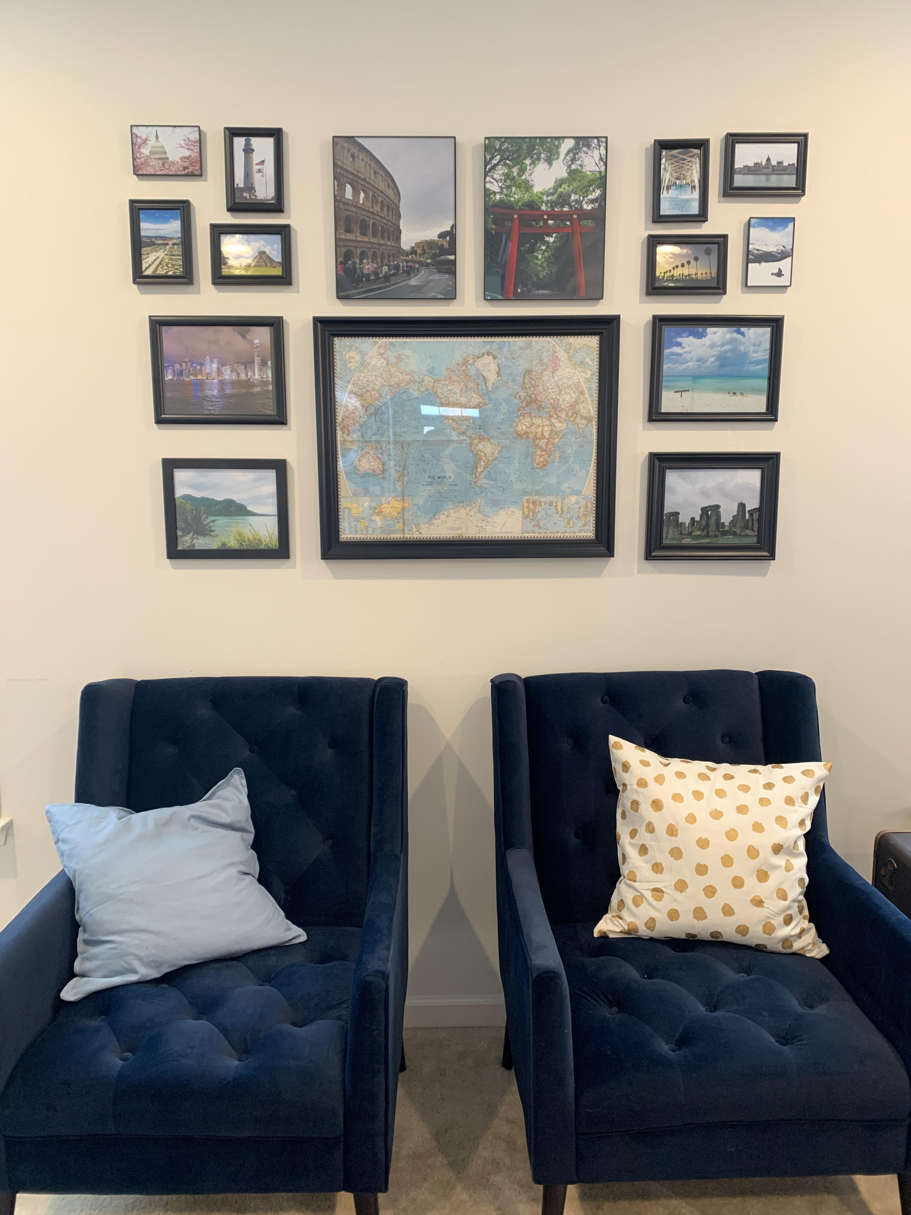 Thrifted all the frames for our gallery wall. Photos are all our own travel photos, and the map ...