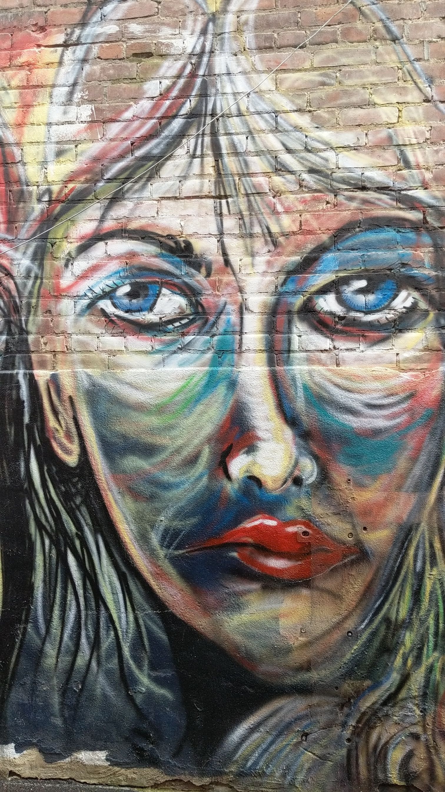 Trippy alleyway mural in downtown Sandpoint | Scrolller