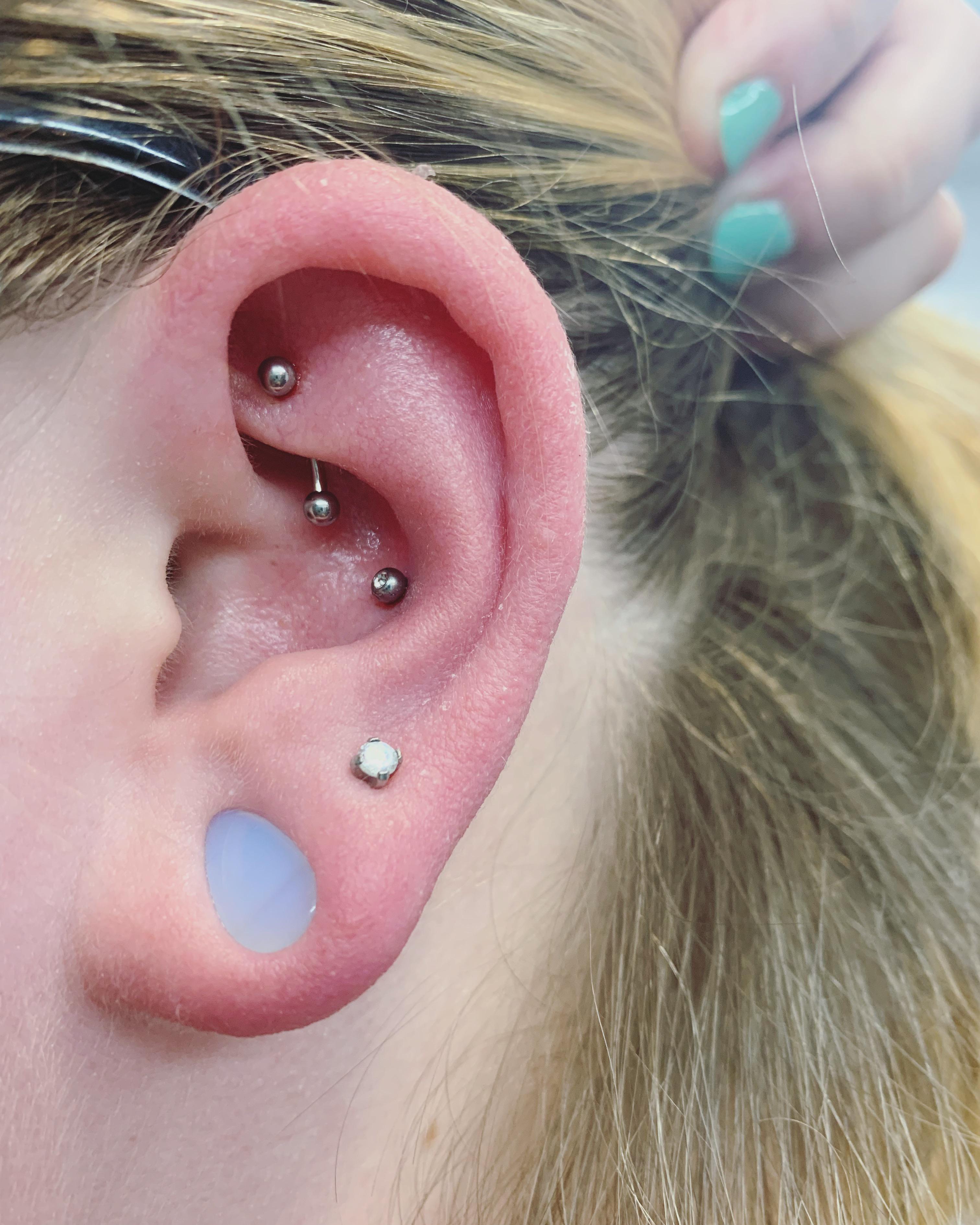 Two new piercings yesterday! Rook & conch | Scrolller