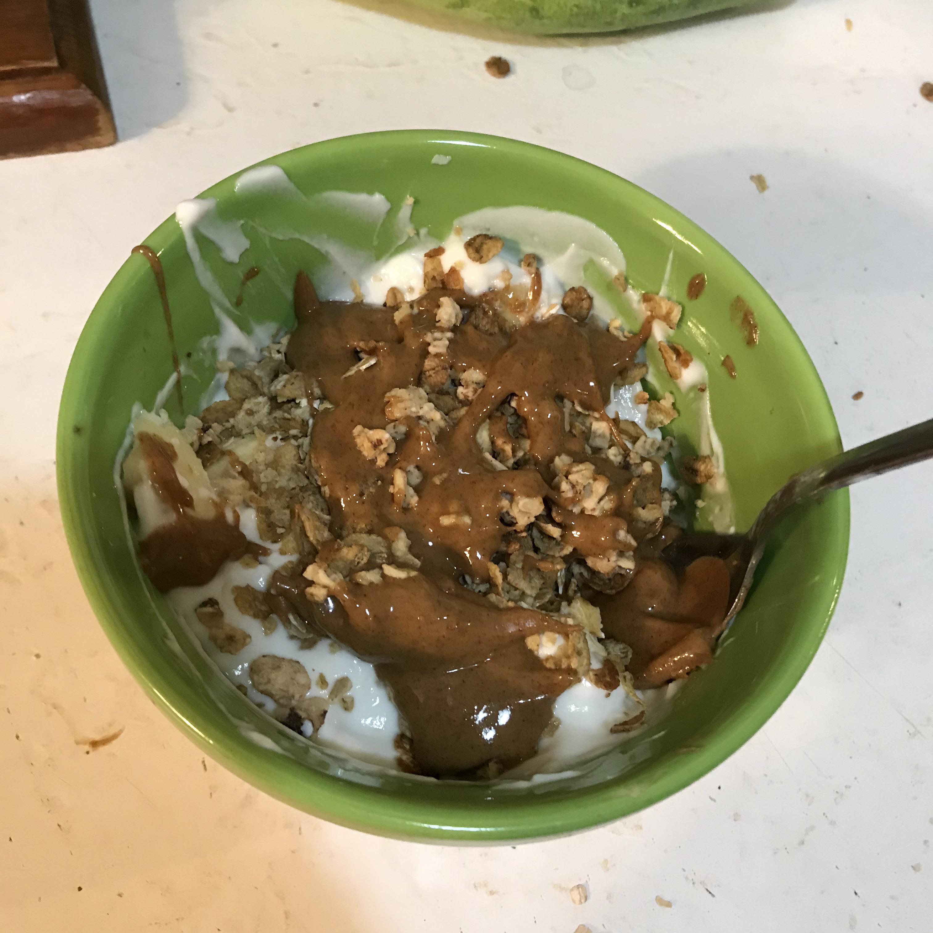 vanilla yogurt, banana, granola and almond butter | Scrolller