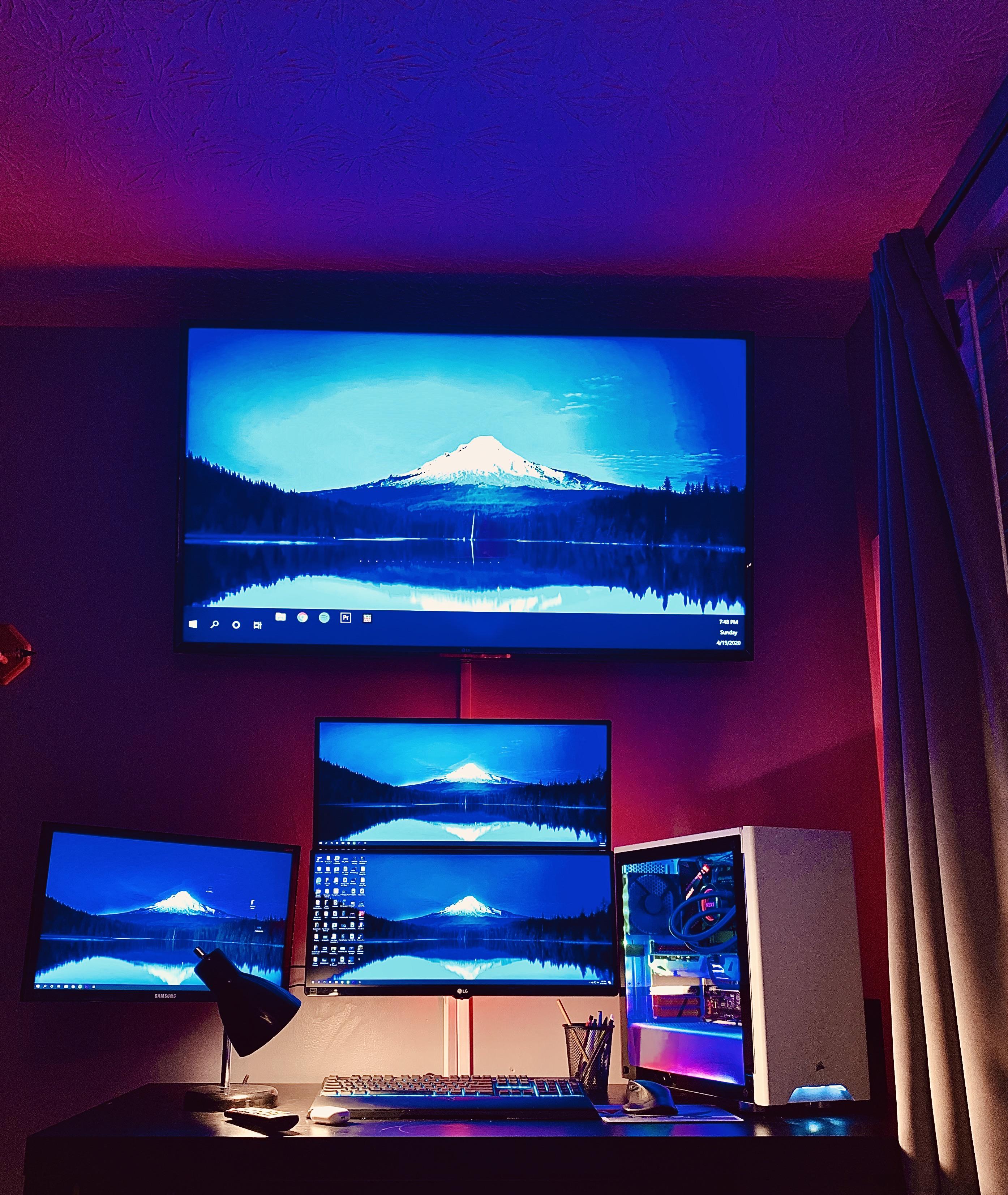 video editing setup: MXMaster, 2 LG ultrawides, 55” LG 4K TV (for video ...