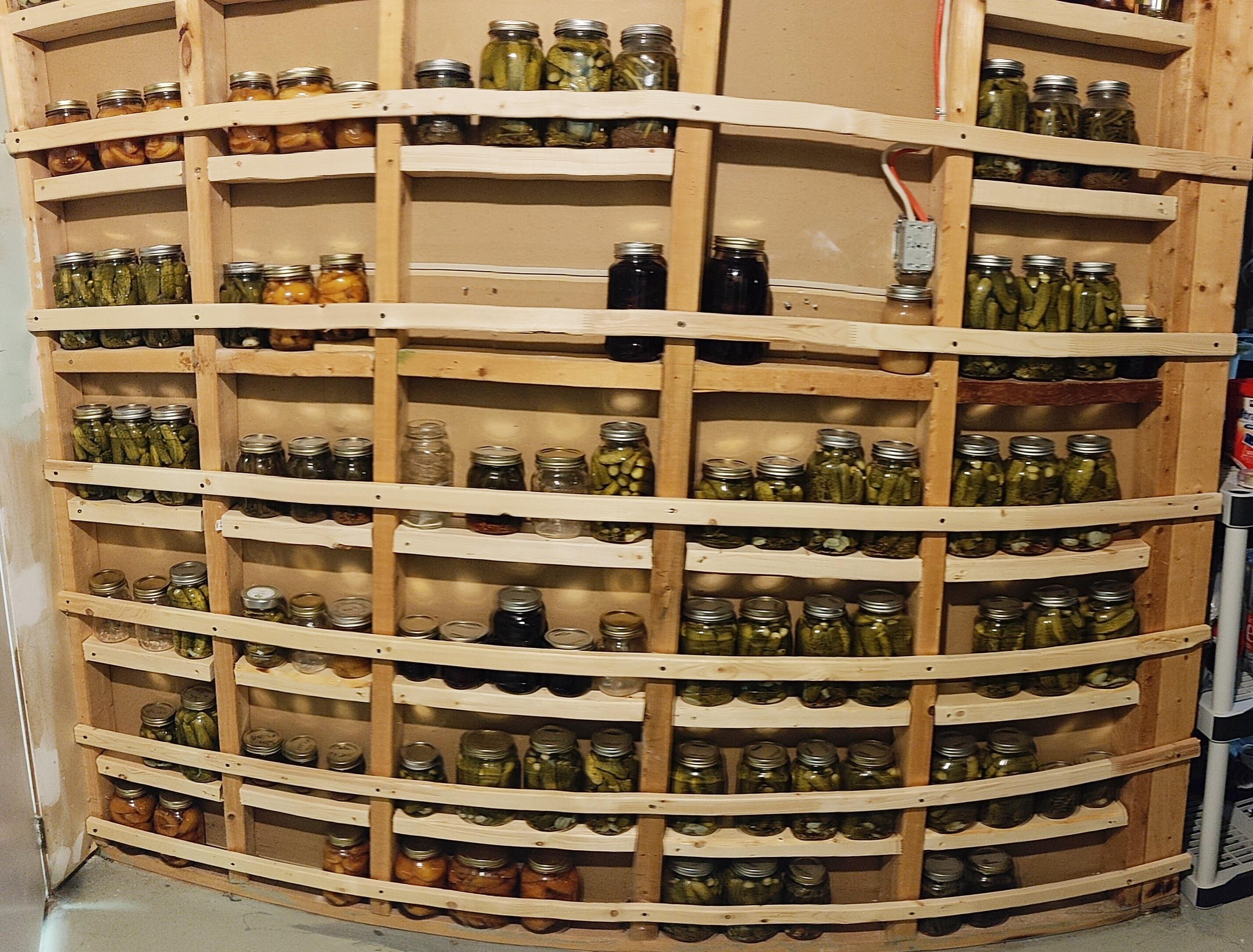 We used up some wasted space between exposed studs in our basement for storage | Scrolller