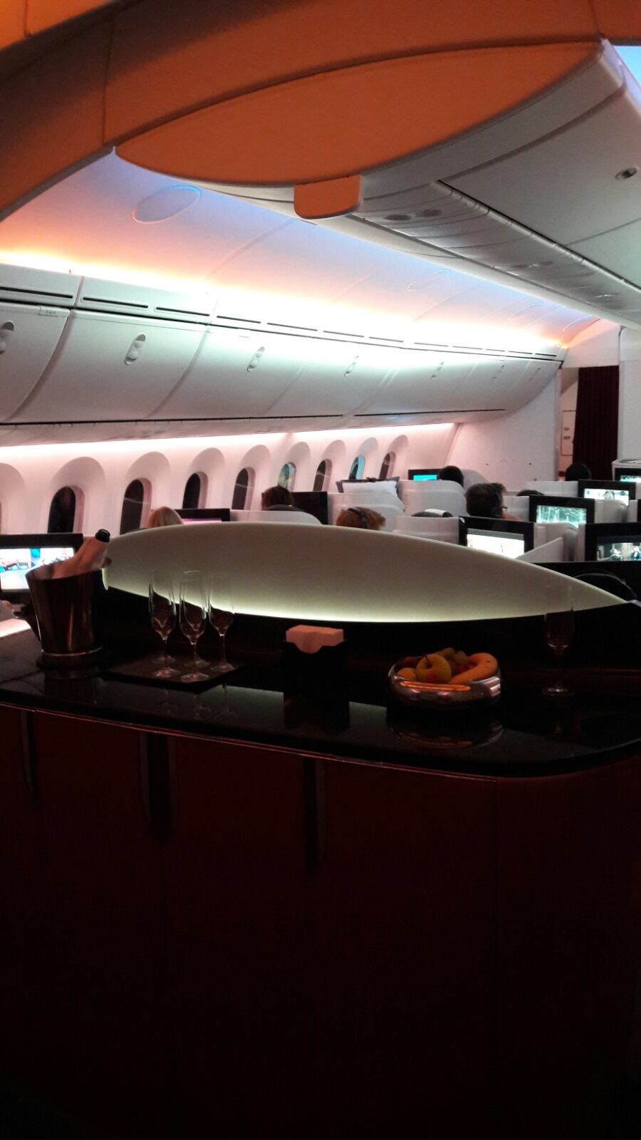 Welcome onboard Qatar's newest Dreamliner, business class cabin. I love the bar! | Scrolller
