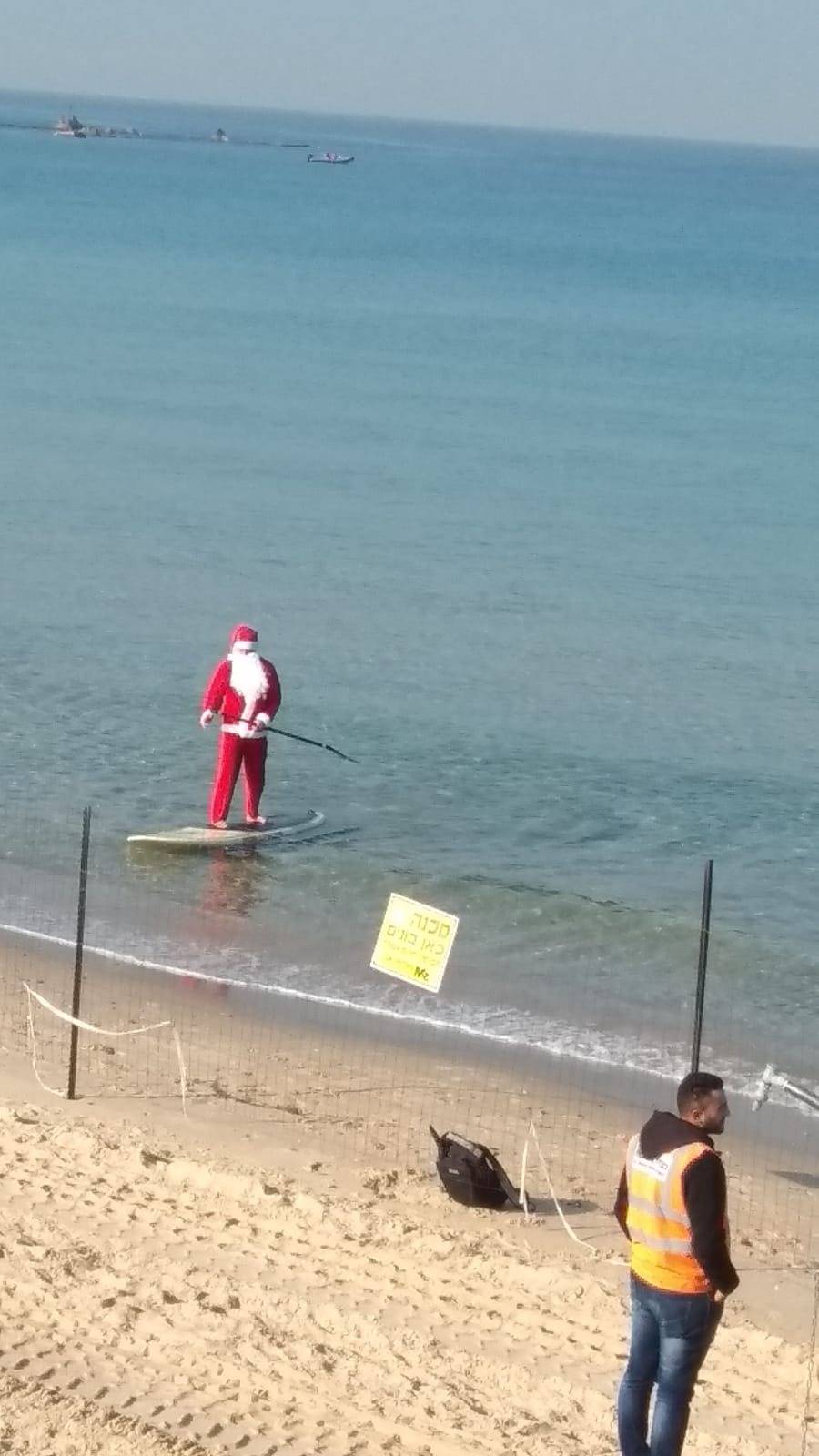 Welcome to Israel, where Santa arrives on a surfboard. | Scrolller