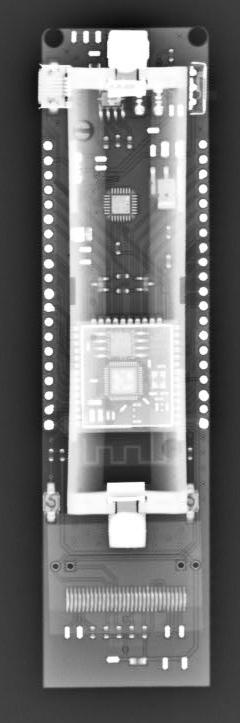 X-ray of a ESP32 module with 18650 battery holder. | Scrolller