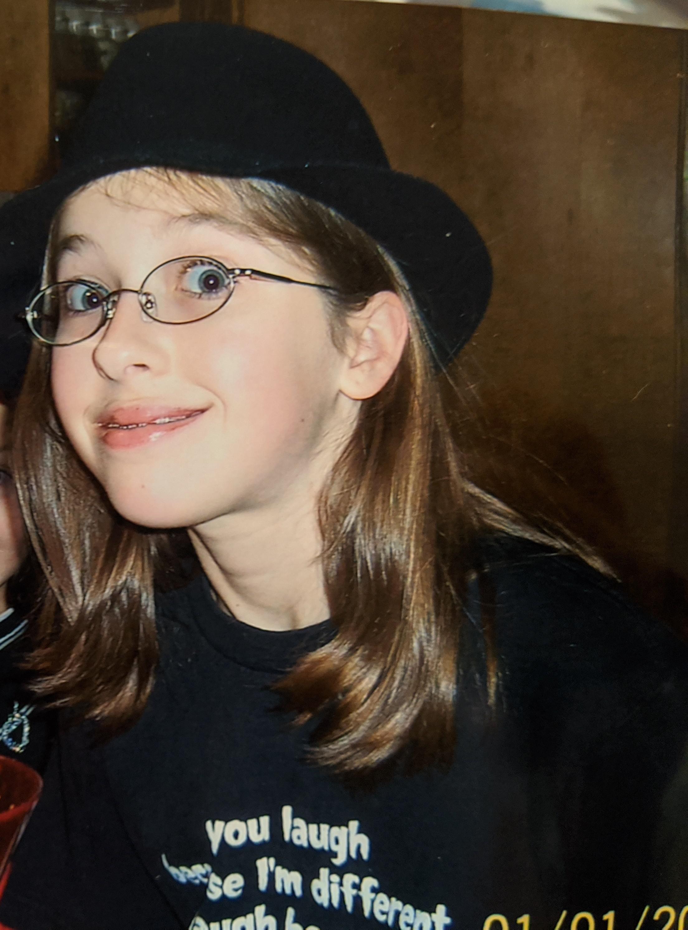 12 years old in '04, wearing my favorite fedora and Hot Topic shirt ...