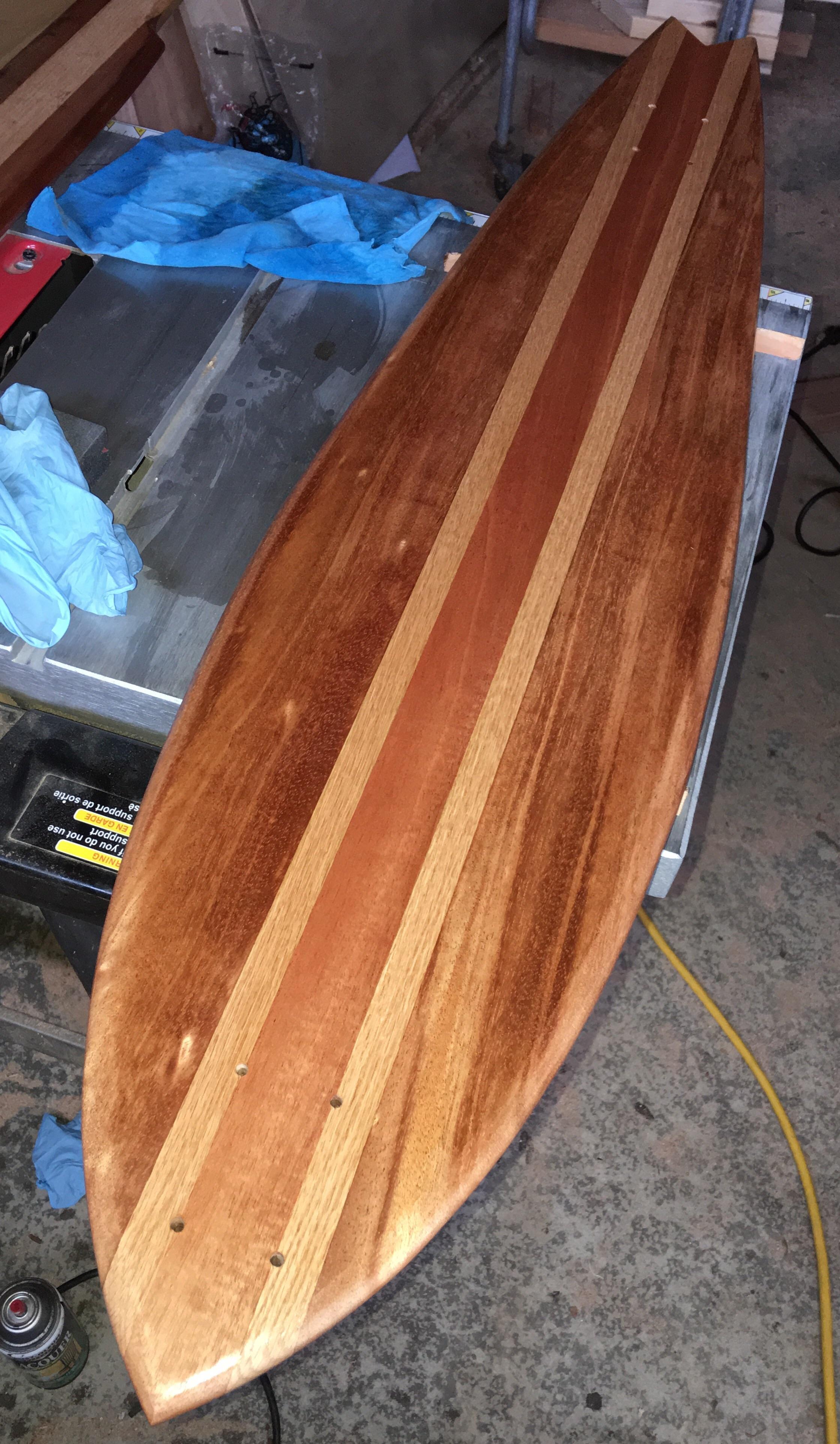 A 42-inch solid wood longboard, made with mahogany and oak. | Scrolller