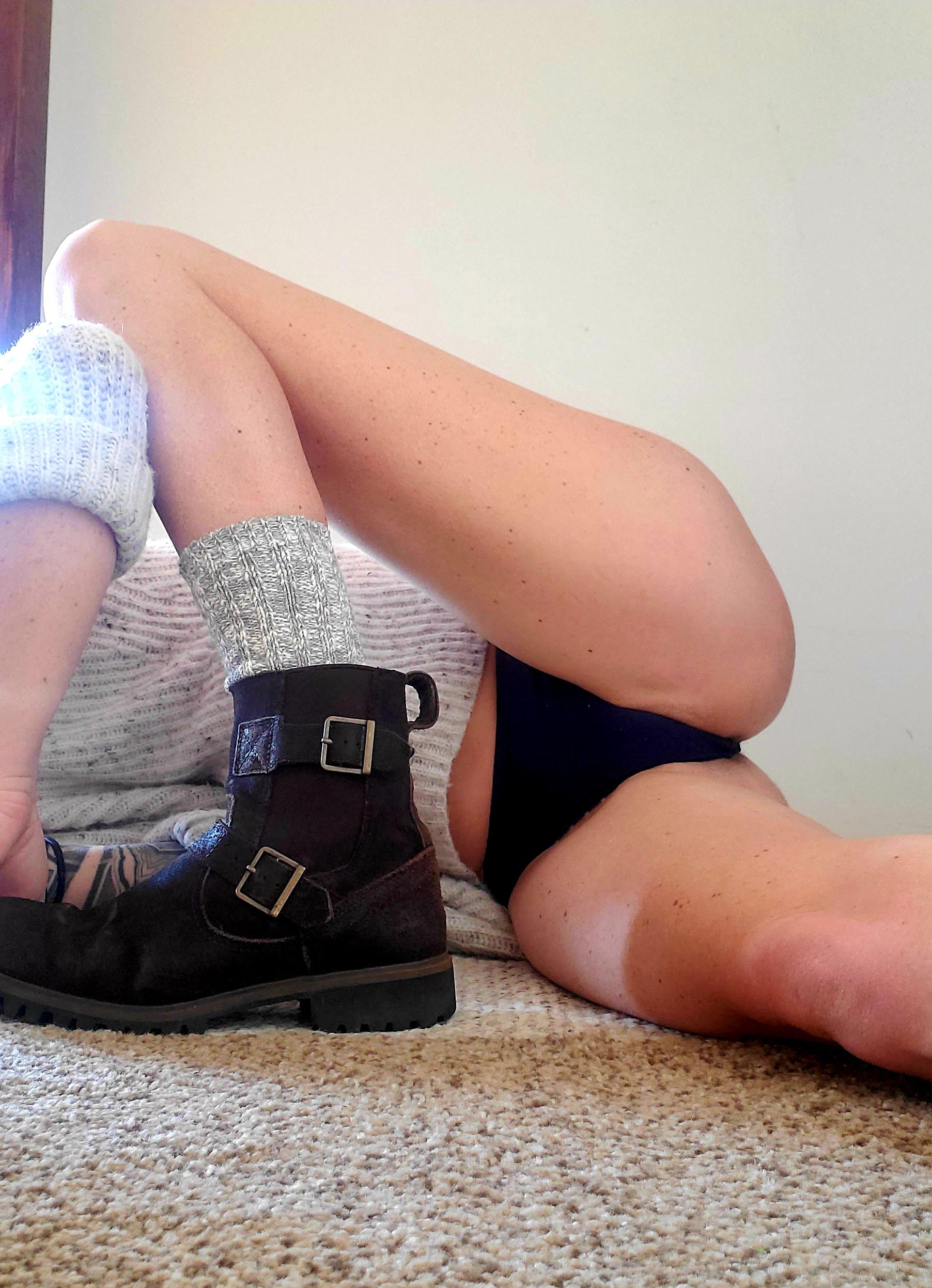 A bendy babe in boots. | Scrolller