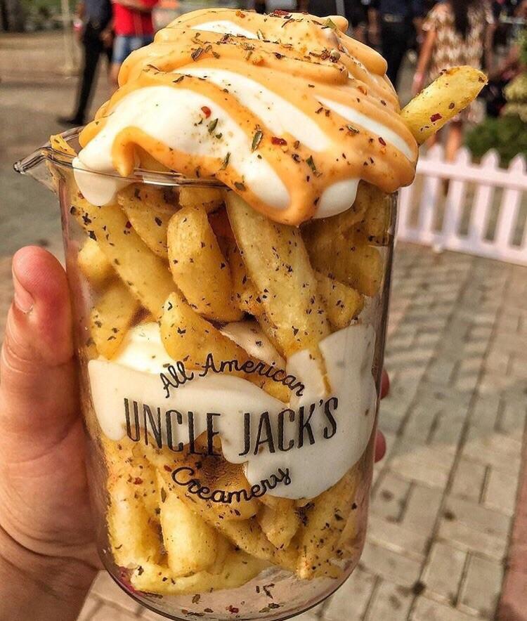 A cup of fries with mush on top | Scrolller