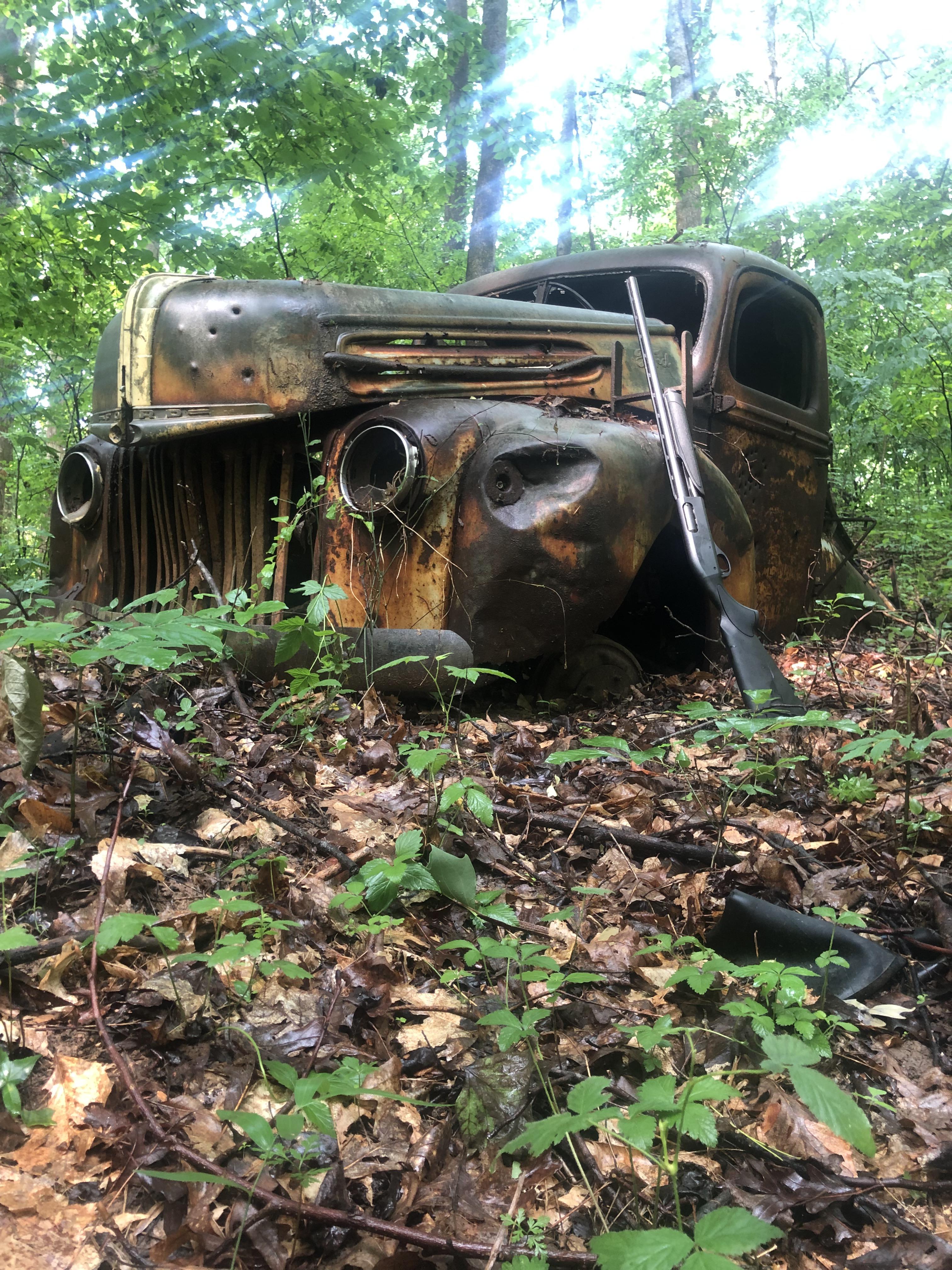 A (my) rust bucket leaning up against an old Ford. | Scrolller