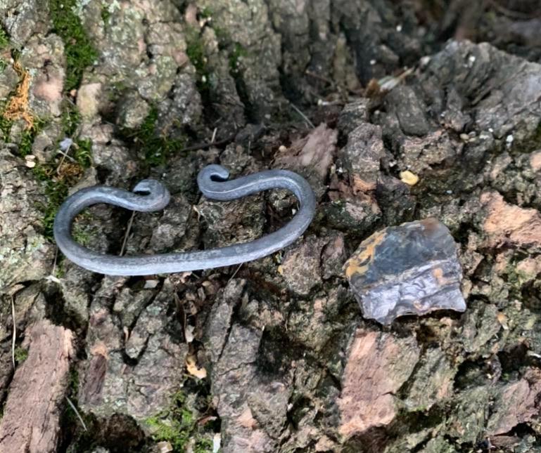 A simple flint striker. | Scrolller