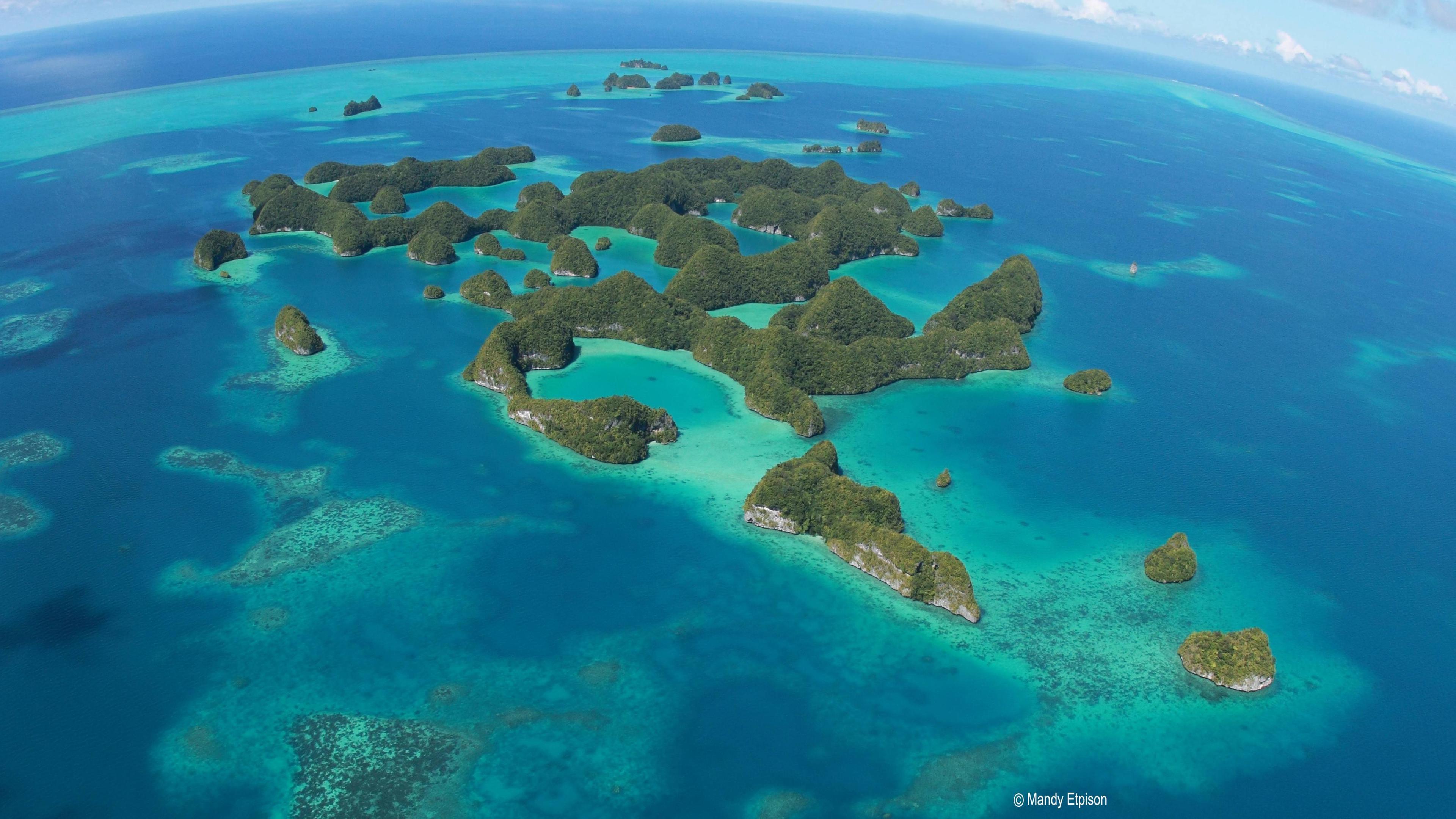 Aerial view of the Rock Islands of Palau | Scrolller