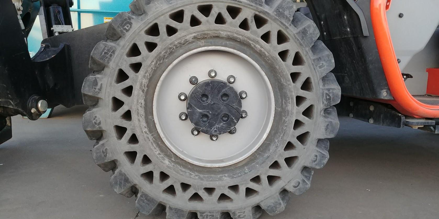 Airless, puncture-proof tires on a forklift. | Scrolller