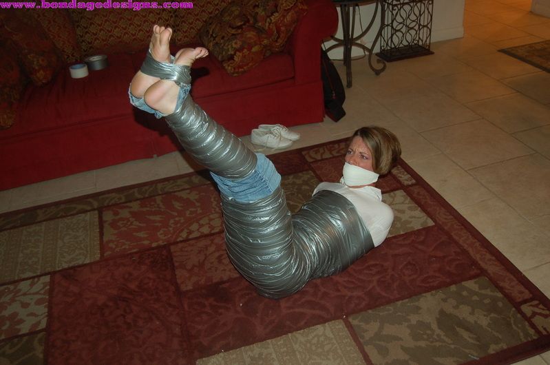 Almost every inch of her is under thick layers of duct tape | Scrolller