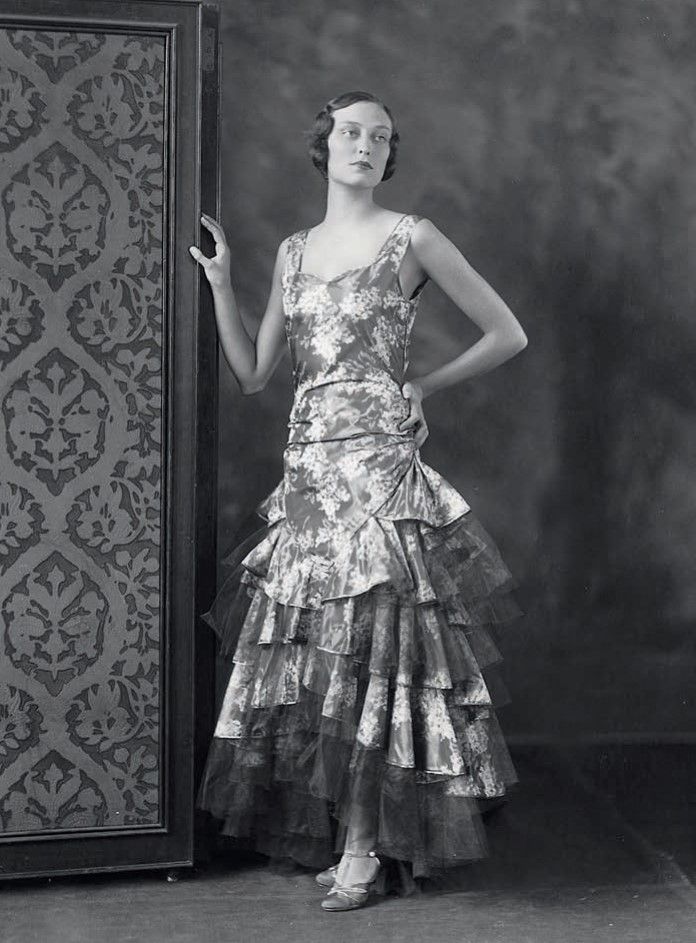 An evening gown from 1929 showing transitional elements of the last years of the 1920s. | Scrolller