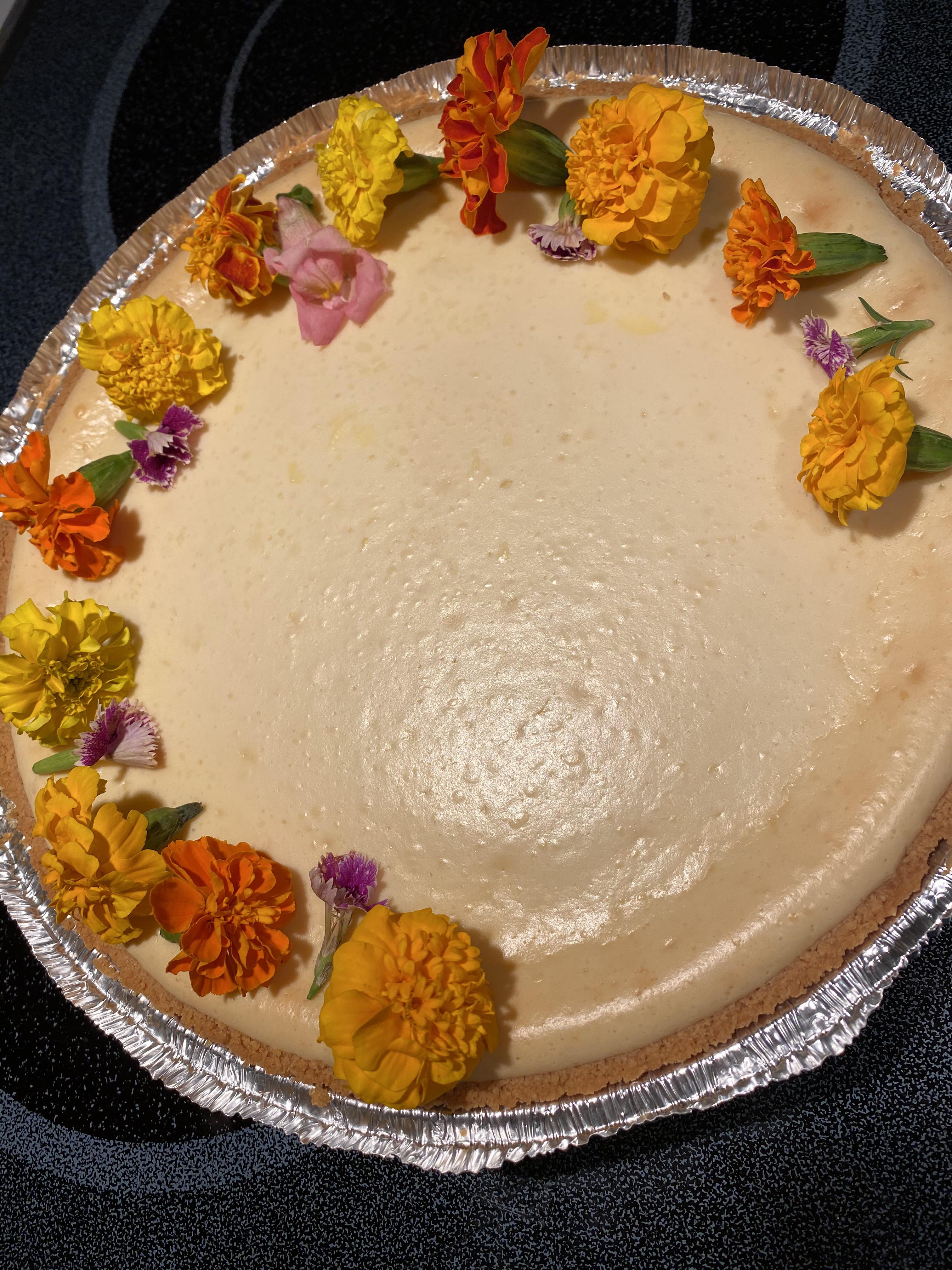 Baked cheesecake with edible flowers | Scrolller