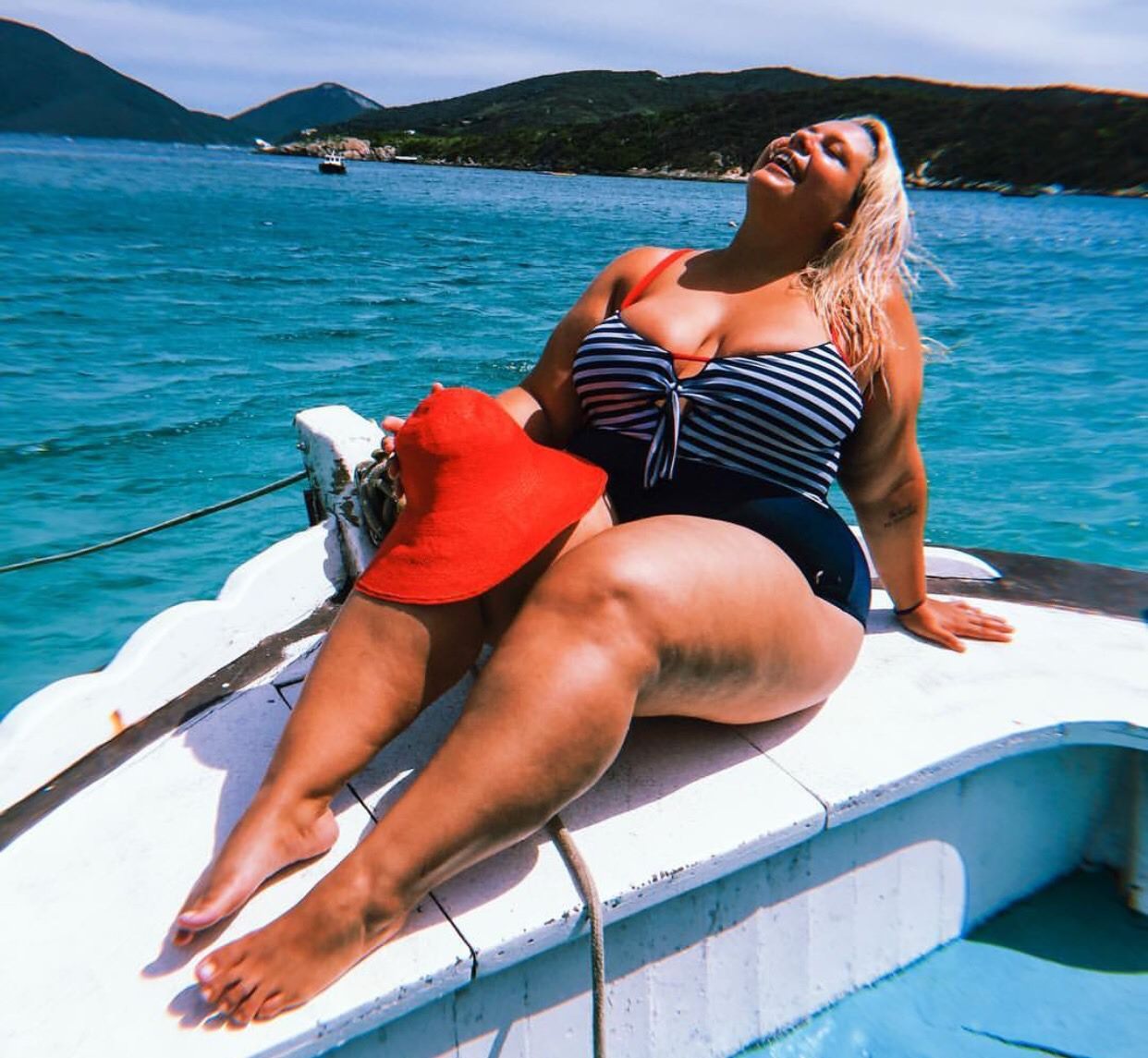 Beautiful blonde soaking up some sun | Scrolller