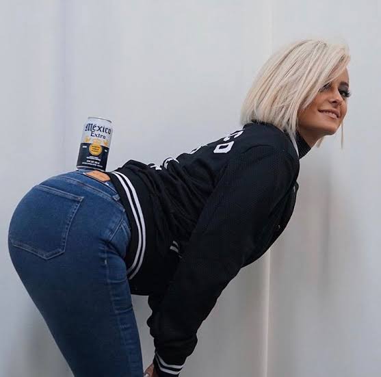 Bebe Rexha - World's Sexiest Drink Holder | Scrolller
