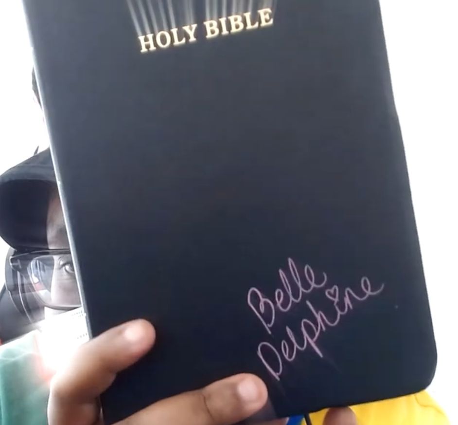 Bible signed by Belle Delphine, +100 holiness, -100 holiness | Scrolller