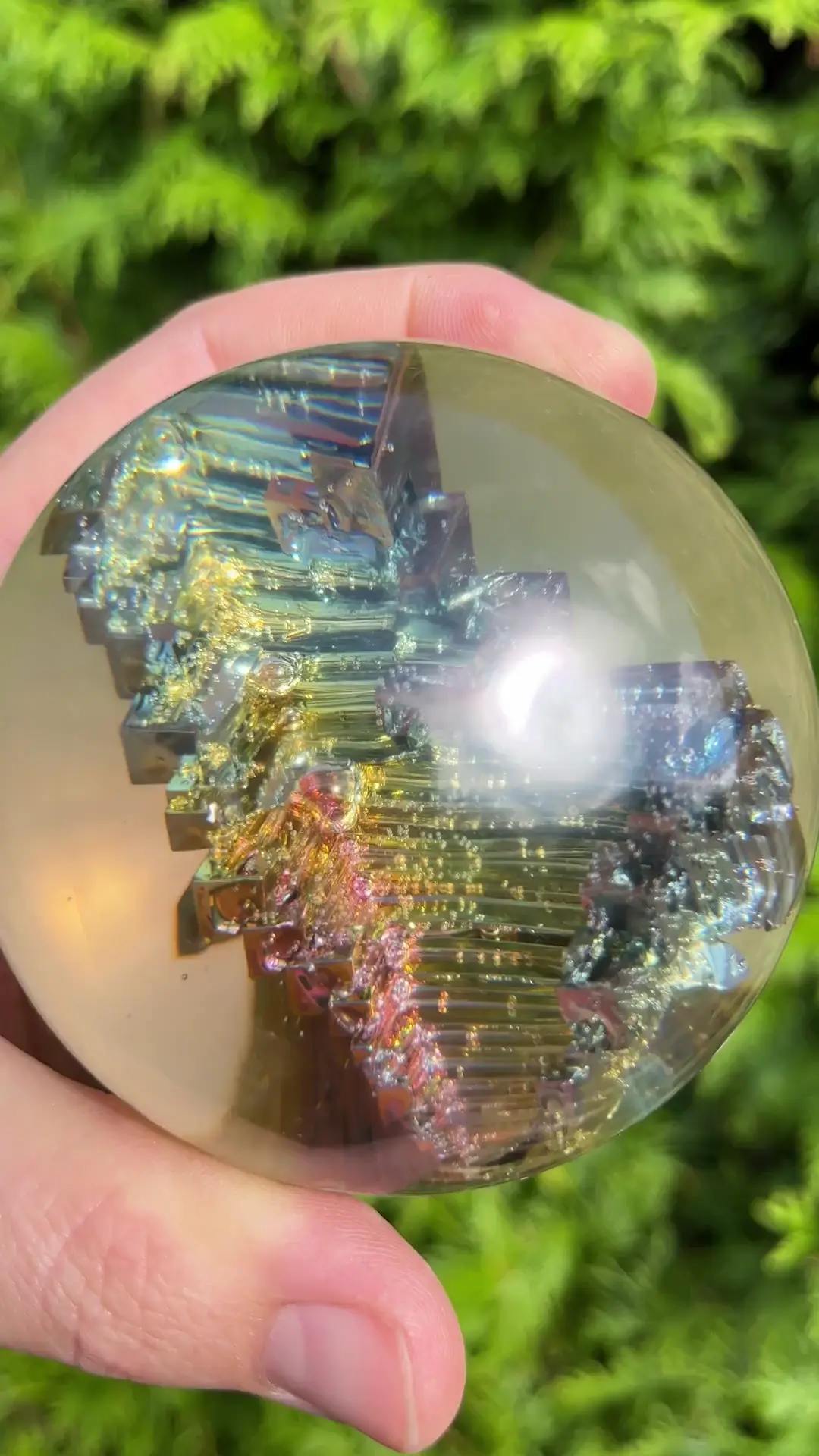 Bismuth crystal in epoxy sphere | Scrolller