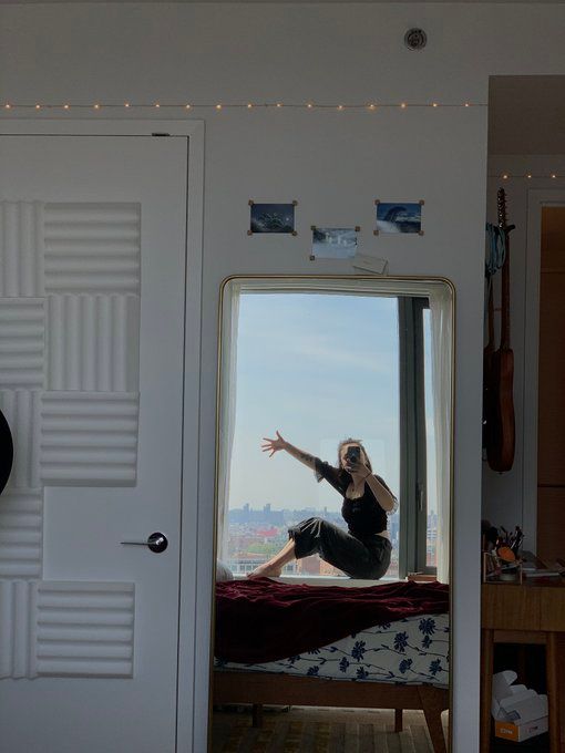 black pants + leg in window | Scrolller