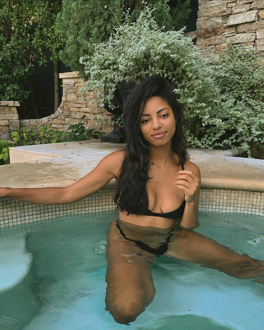 Camille Hyde in black bikini (Dino Charge Pink) | Scrolller