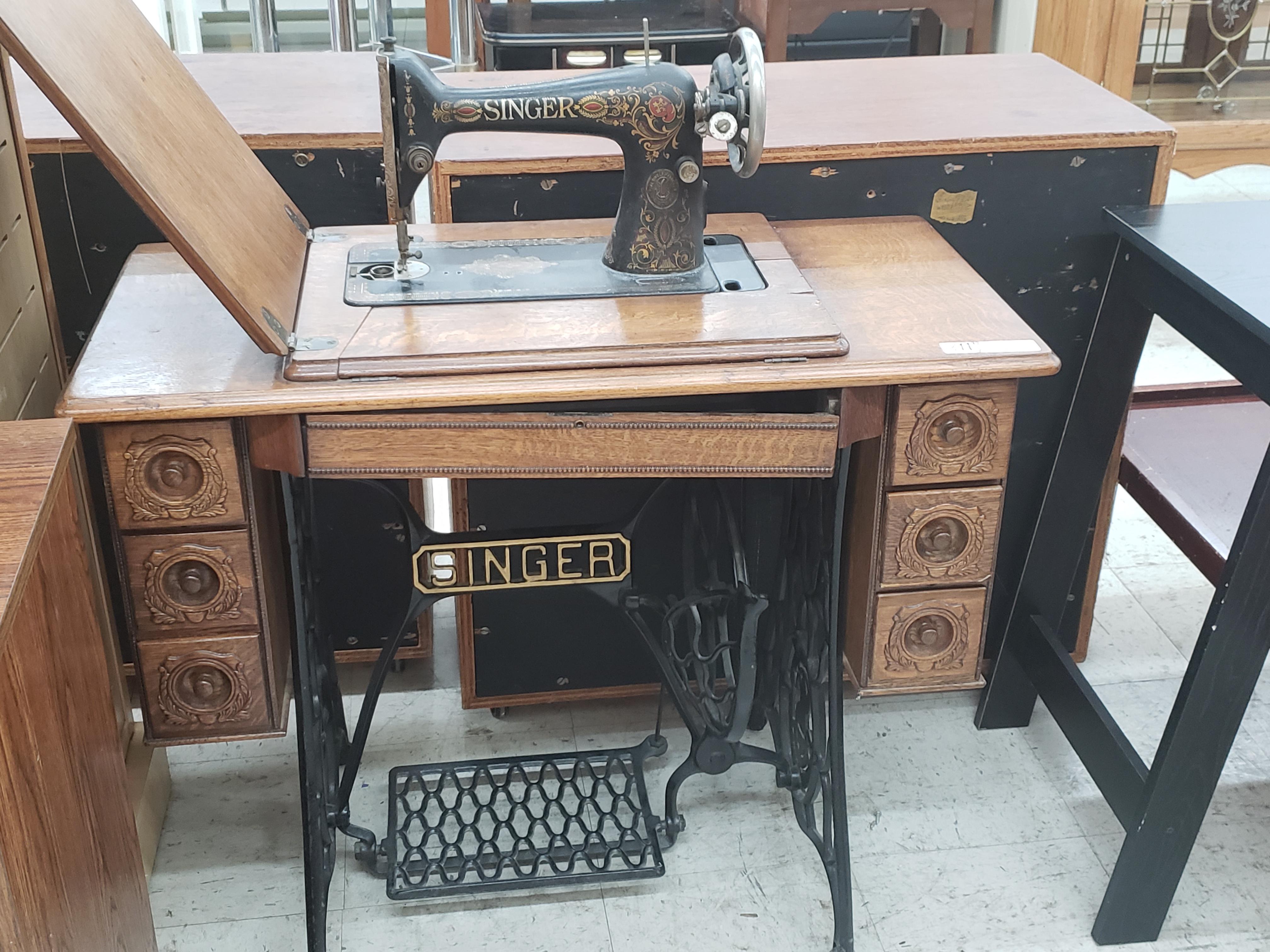 Catch and release--singer sewing machine | Scrolller