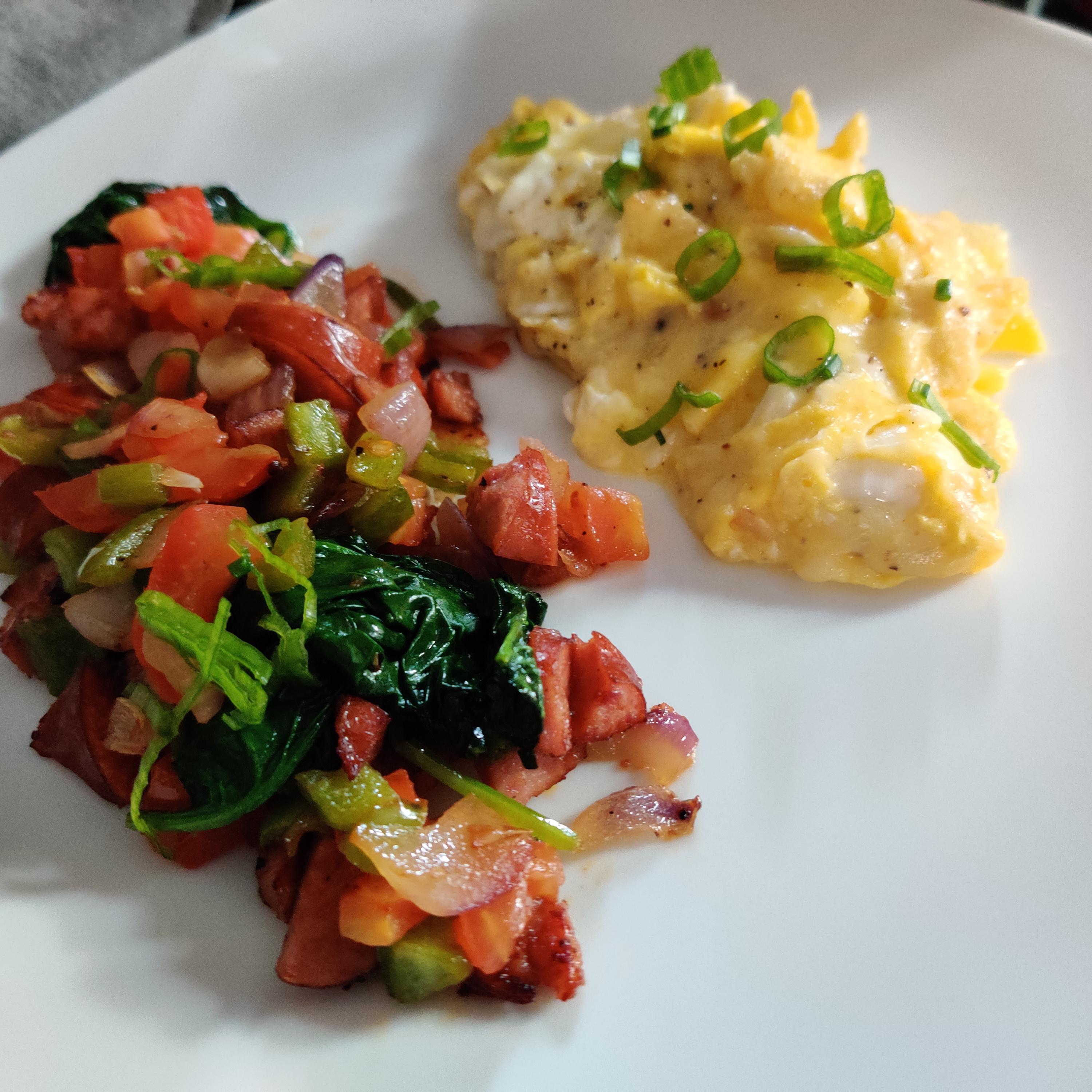Cheesy Egg scramble with sauteed Veggies and keilbasa | Scrolller