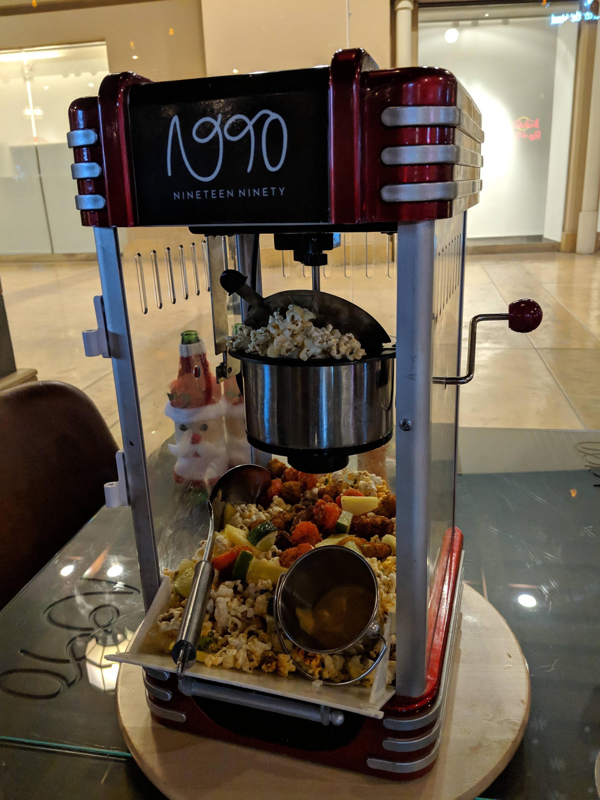 Chicken n' Shrimp in a popcorn machine. | Scrolller