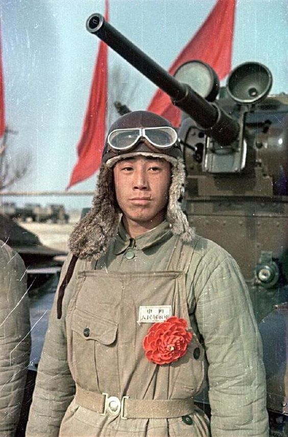 Chinese PLA tanker with a T-26 Soviet light tank during a parade, late 1940's. [564x856] | Scrolller