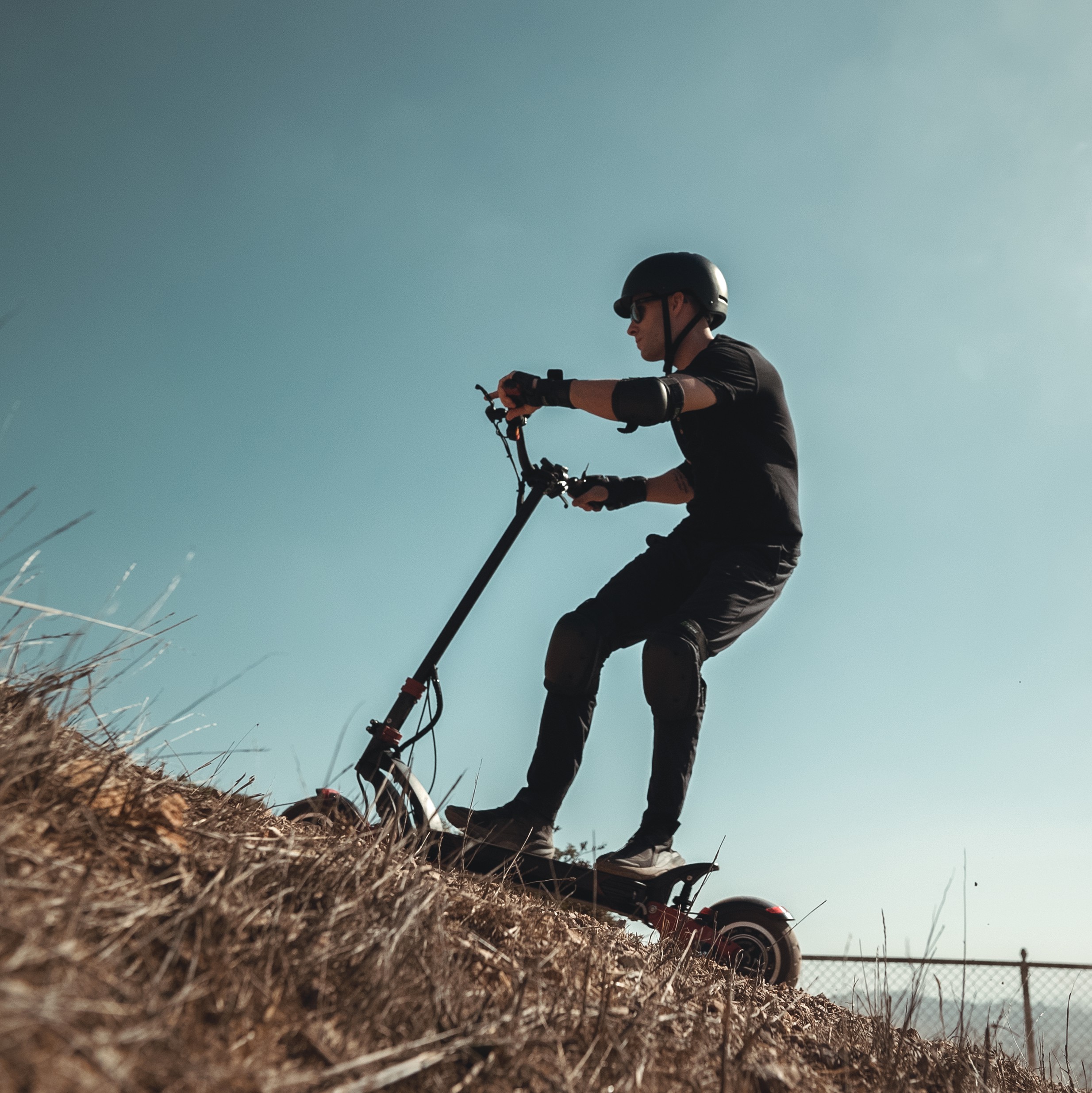 Climbing the hill on an off-road scooter | Scrolller